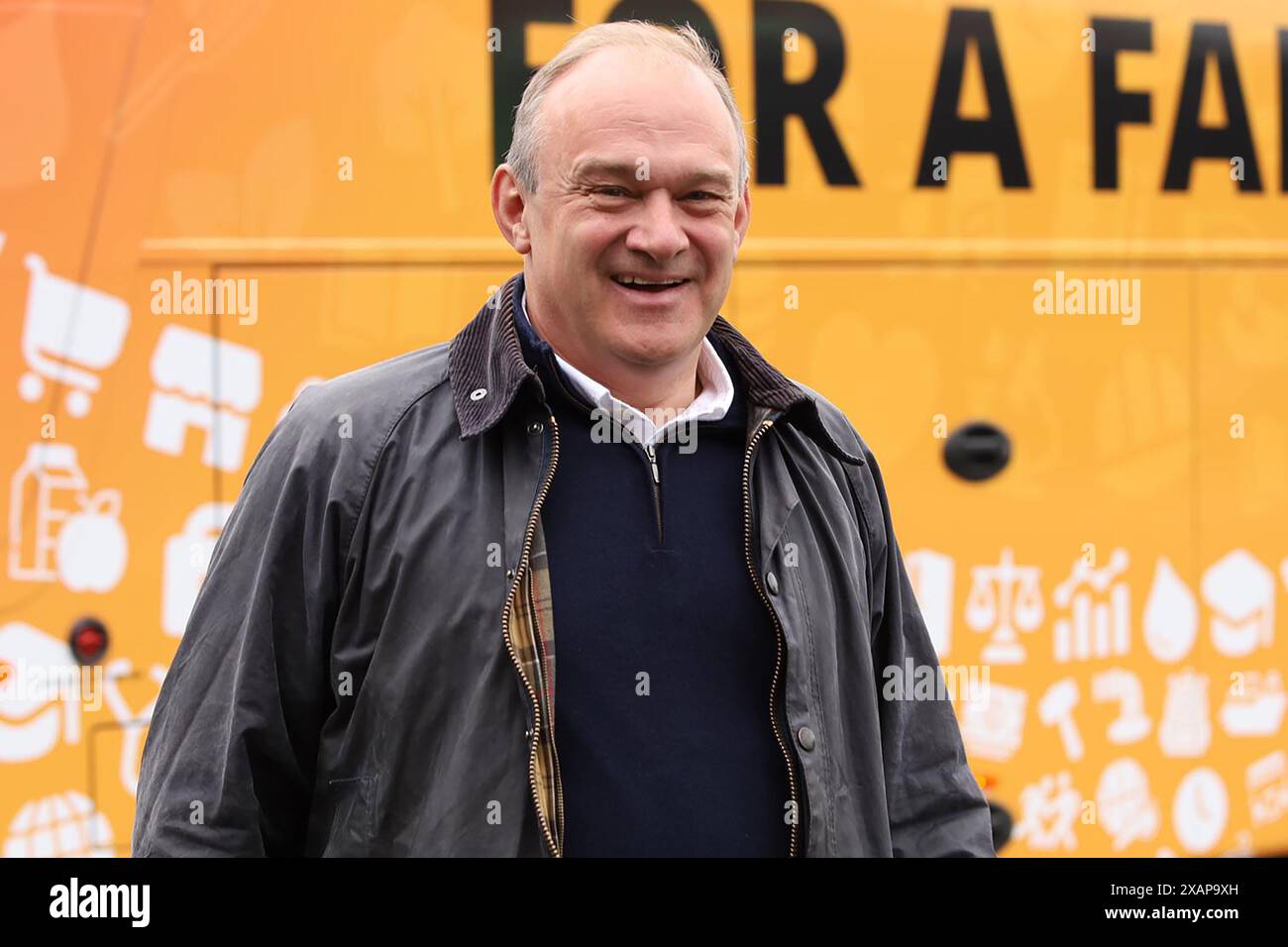 Liberal Democrats leader Sir Ed Davey (left) arrives at Victoria Park ...