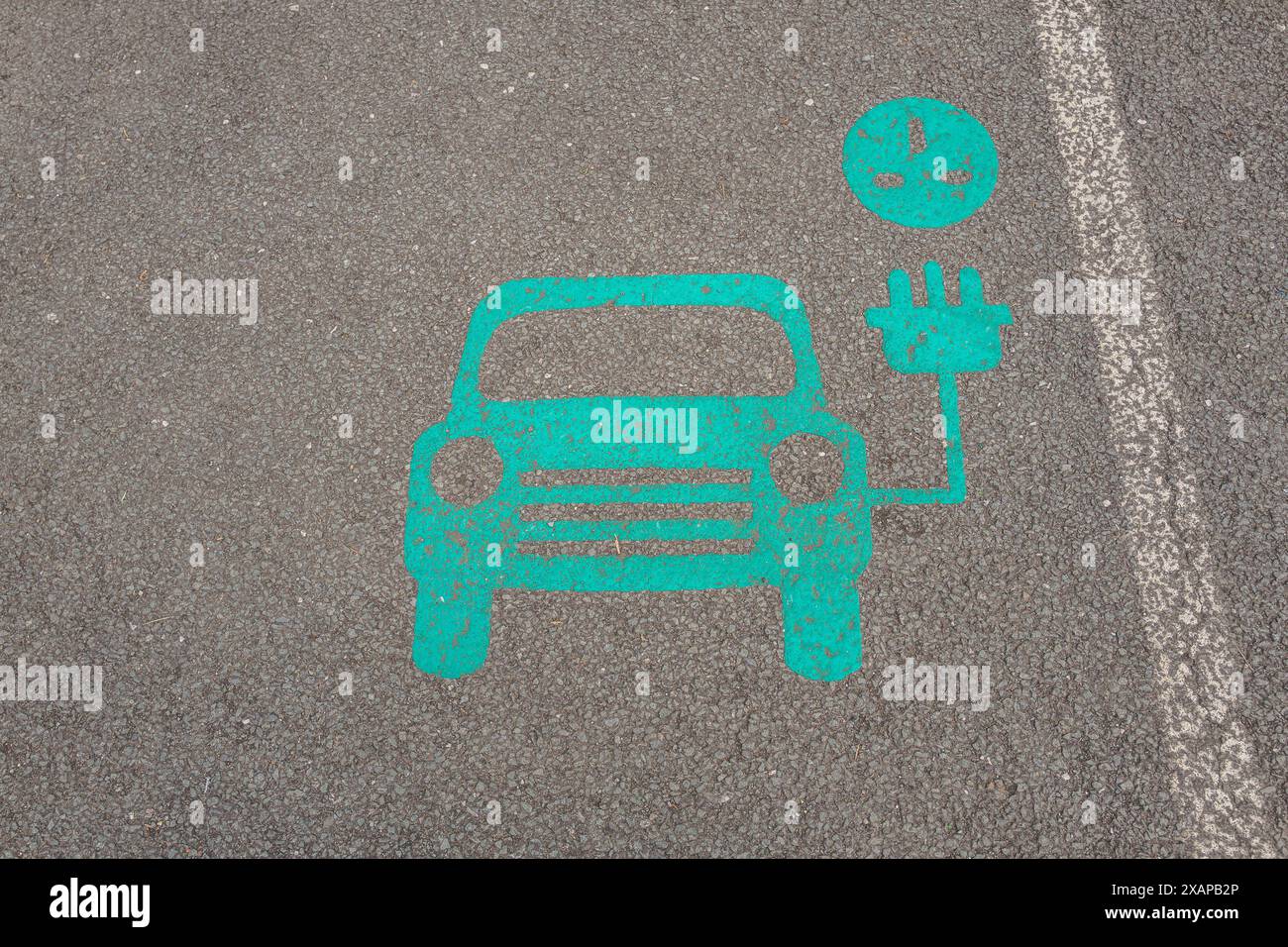 Vehicle charging point ground symbols at the main car park in the Welsh ...