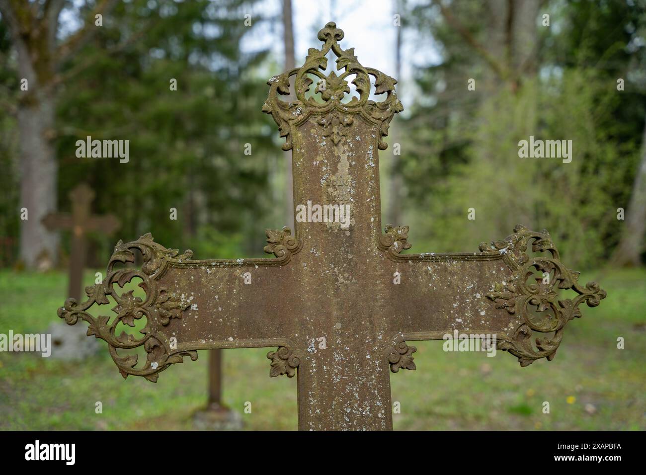 Metal cross in cemetery hi-res stock photography and images - Alamy
