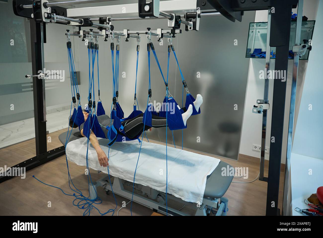 Elderly patient in a special harness Stock Photo - Alamy