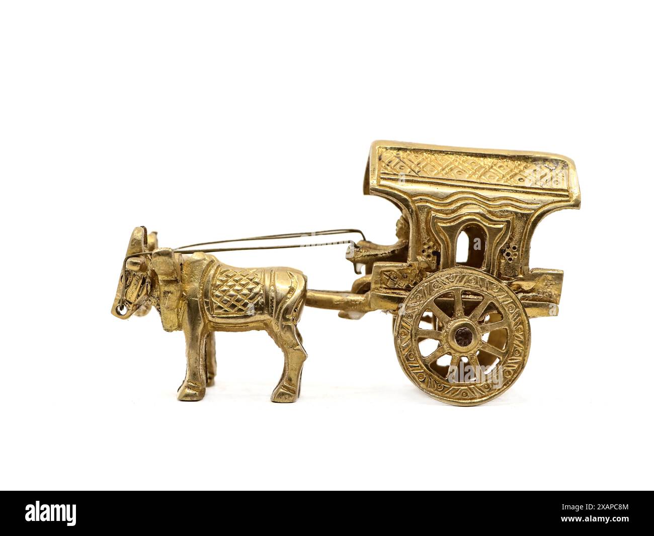 an intricately crafted antique gold model of a vintage bullock cart ...