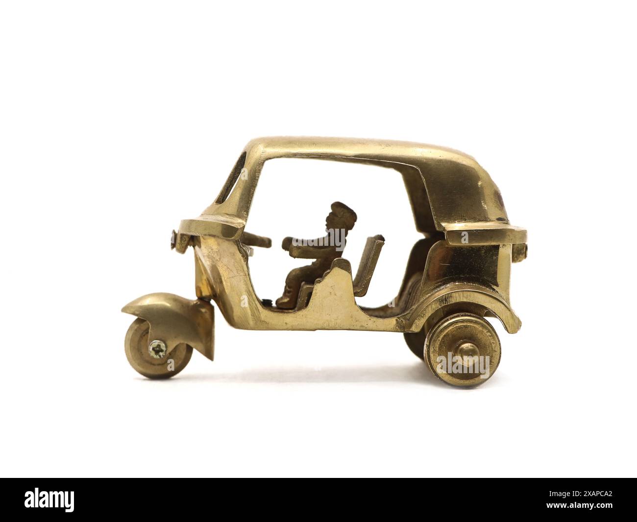 a vintage toy model of a three wheeler auto rikshaw vehicle crafted in ...