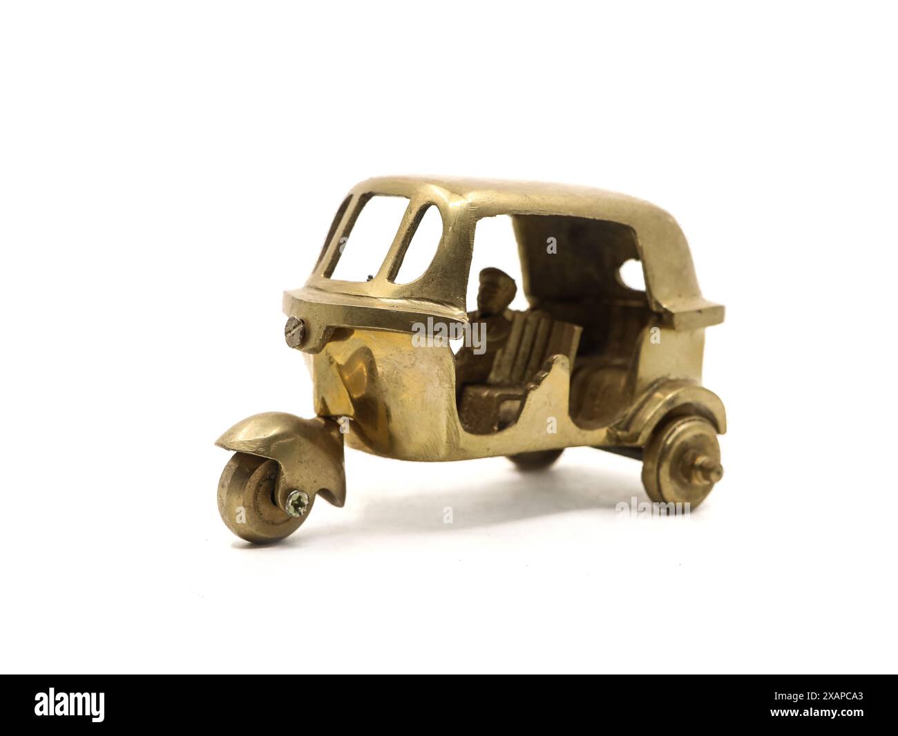 a vintage toy model of a three wheeler auto rikshaw vehicle crafted in ...
