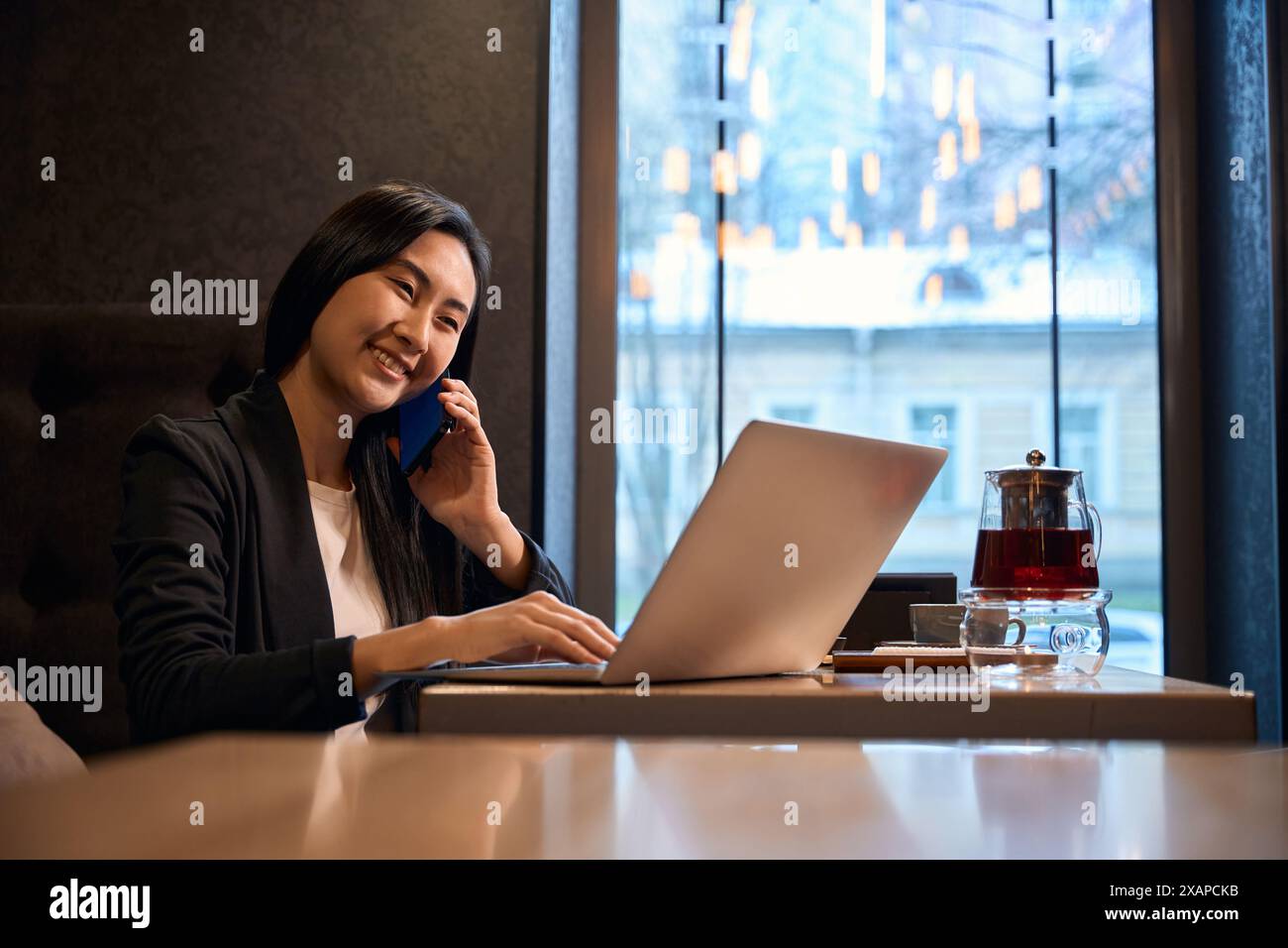 Young asian woman orders food hi-res stock photography and images - Alamy