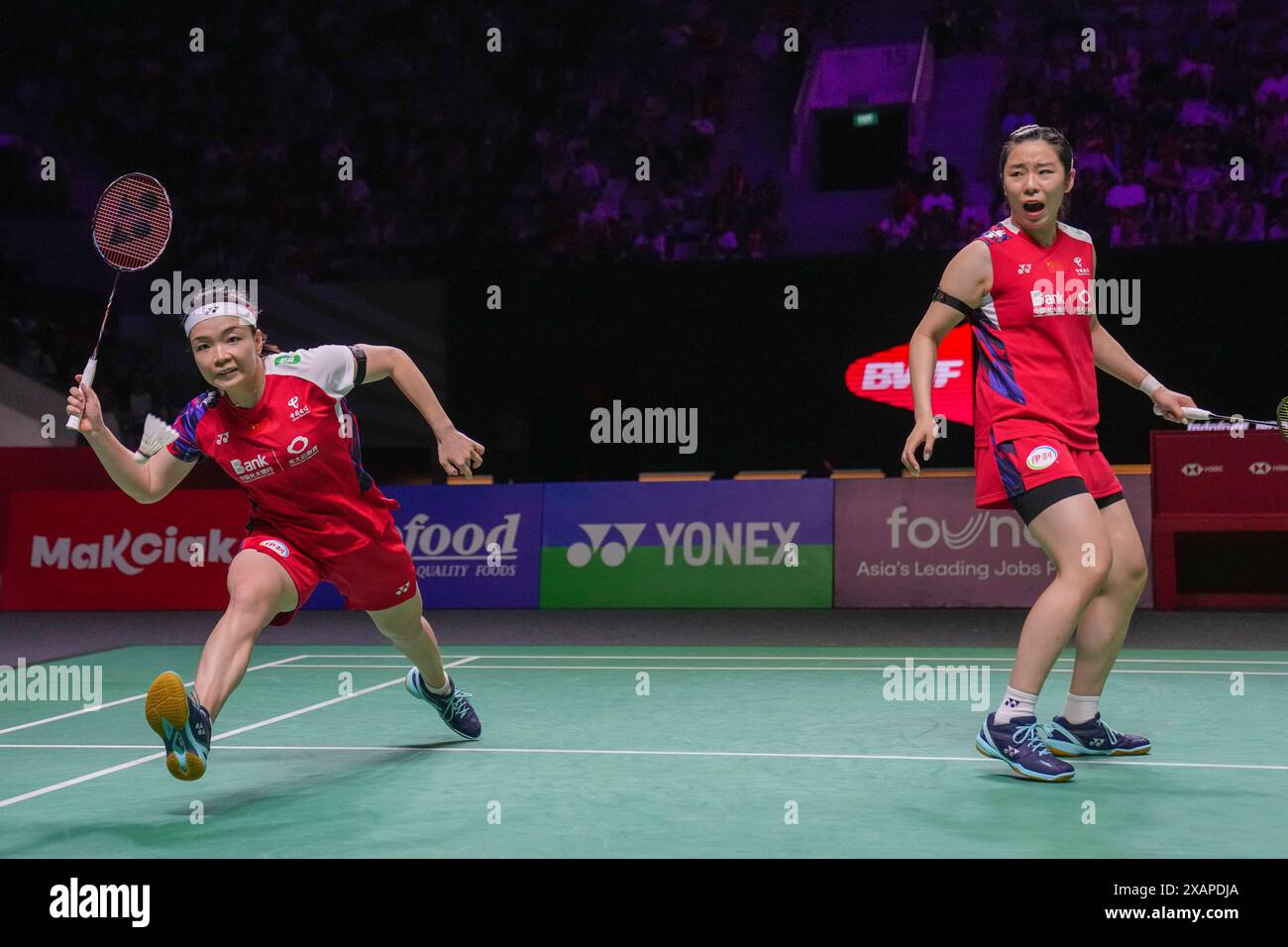 China's Chen Qing Chen, left, and Jia Yi Fan play against Japan's Mayu Matsumoto and Wakana ...