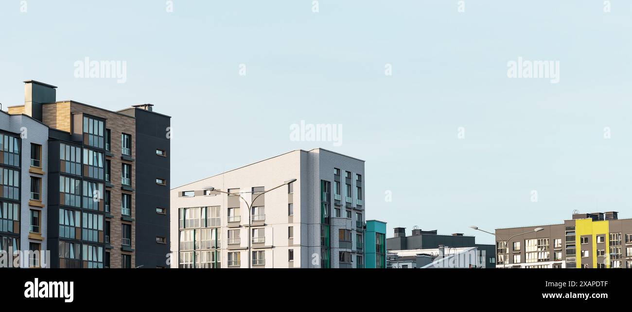 Modern urban buildings with glass facades and large windows. Ideal for ...