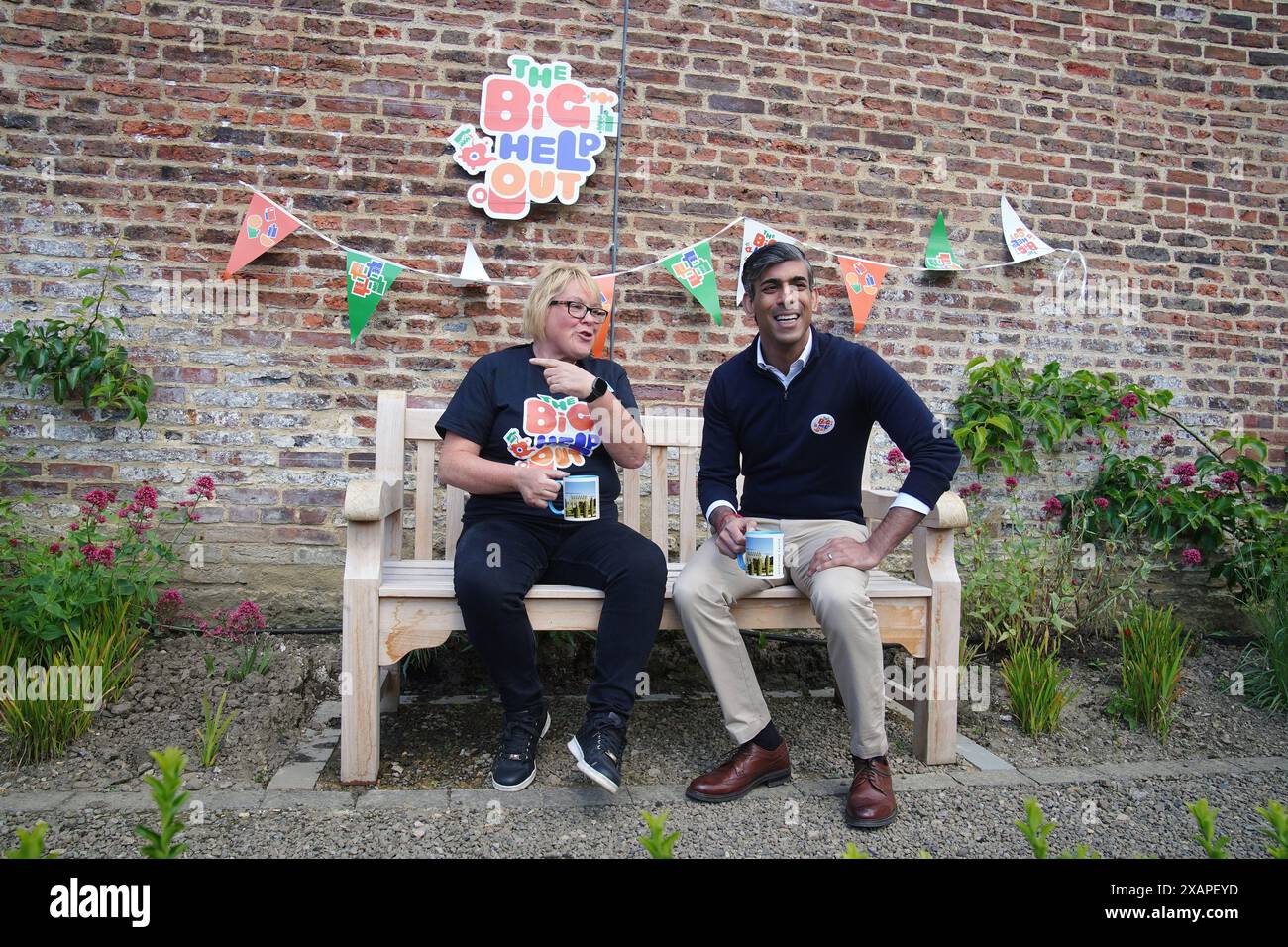 Prime Minister Rishi Sunak drinking tea whilst talking to Hilary ...