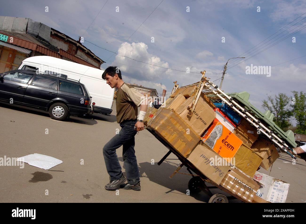 a handcart or trolley for transporting goods and other things a ...