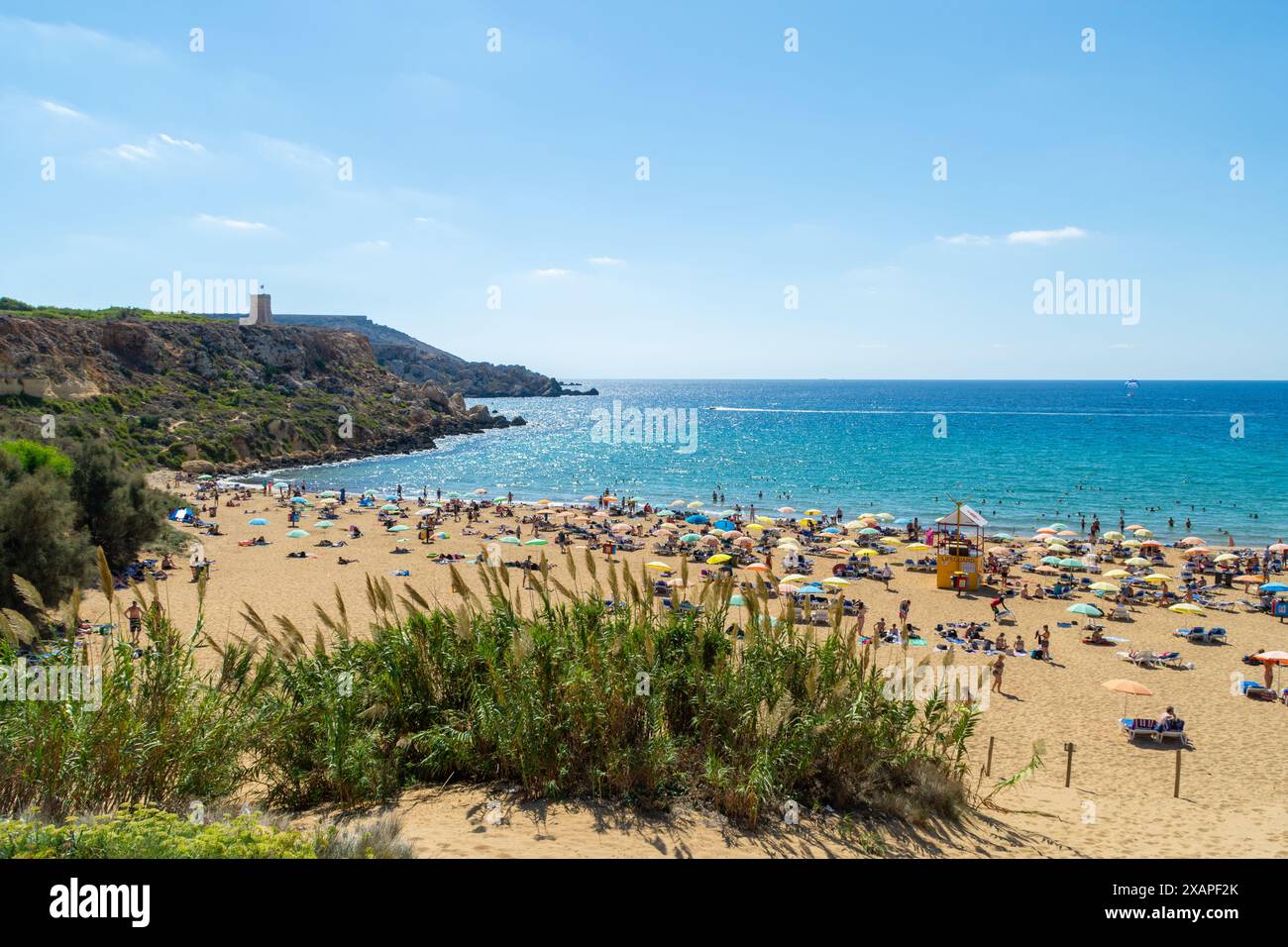 Mellieħa, Malta - October 1st 2018: Sunbathers on the beach at Golden ...