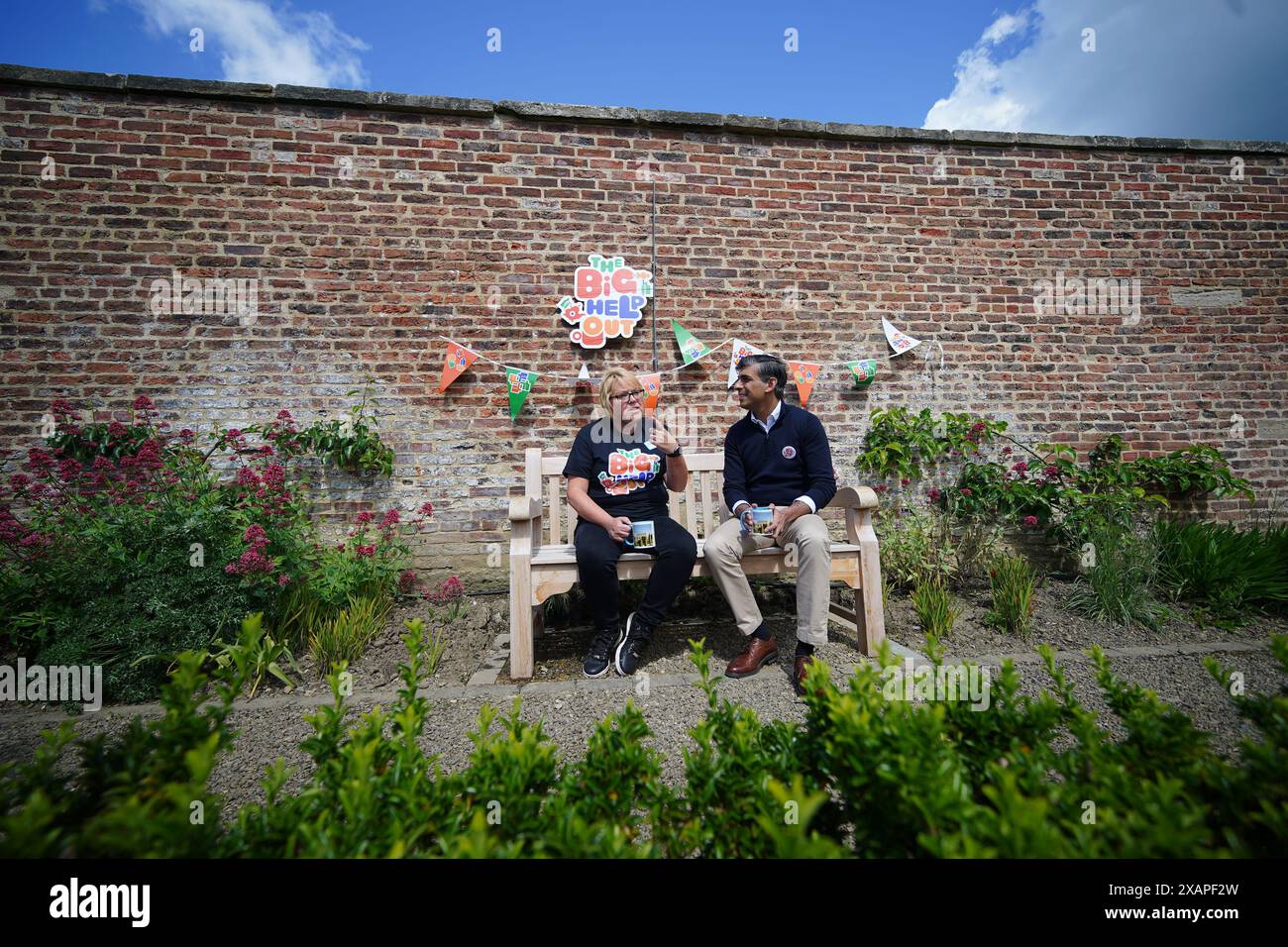 Prime Minister Rishi Sunak drinking tea whilst talking to Hilary ...