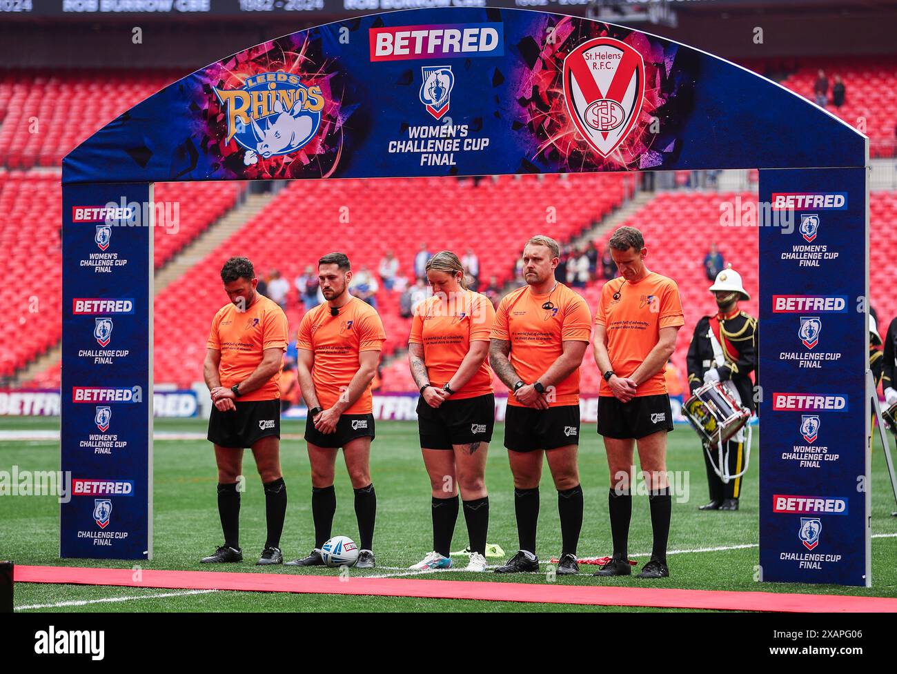 Players, match officials and fans take part in a minutes silence to ...