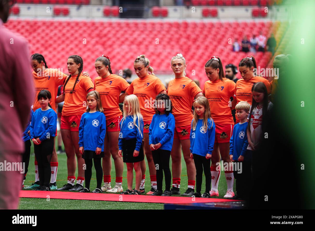 Players, match officials and fans take part in a minutes silence to ...
