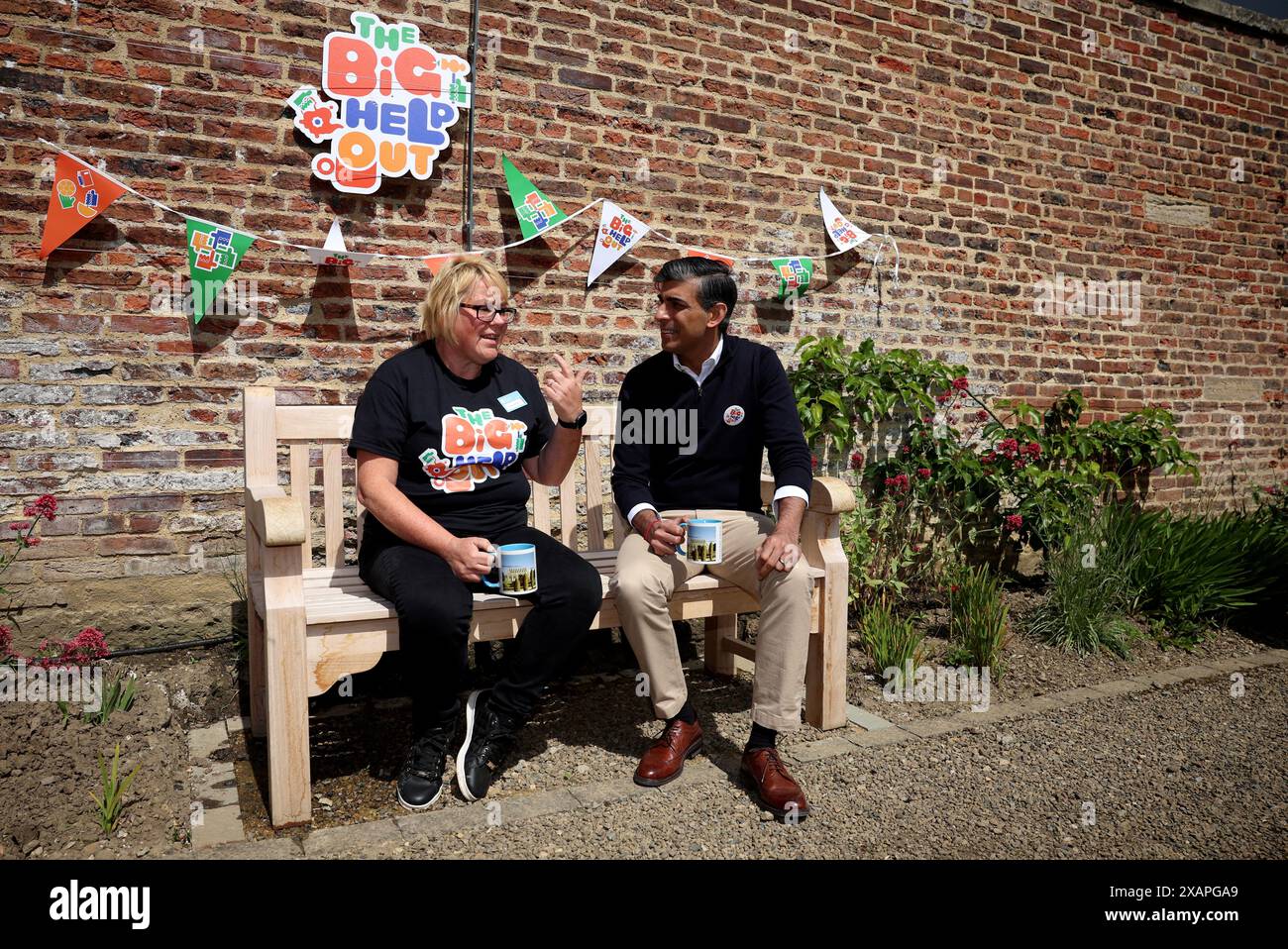 Prime Minister Rishi Sunak drinking tea whilst talking to Hilary ...