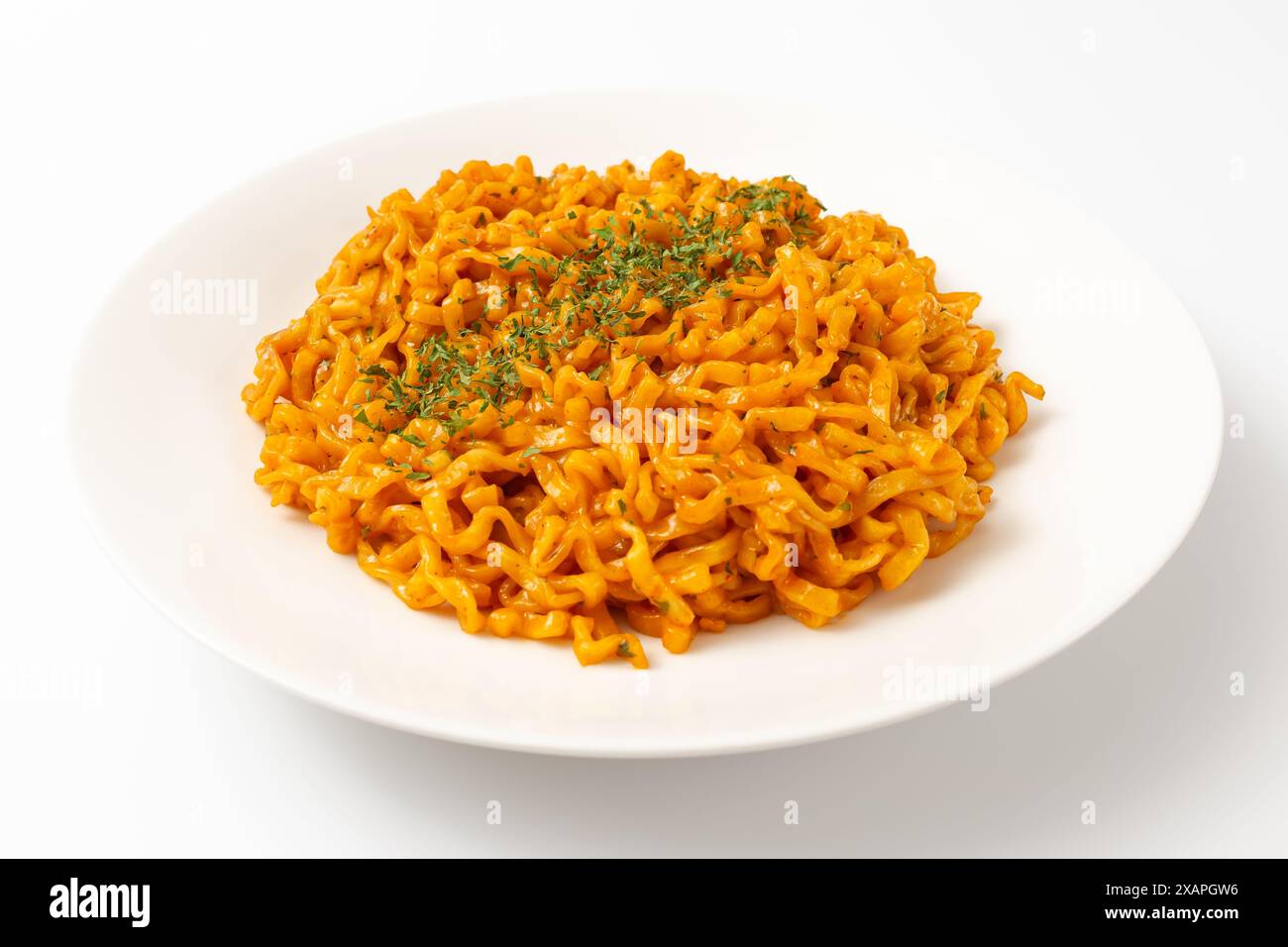 Korean spicy carbonara stir-fried ramen on white background Stock Photo ...