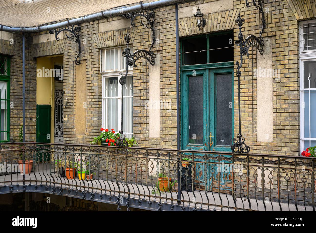 The communal area of a historic apartment building, Budapest, Hungary ...