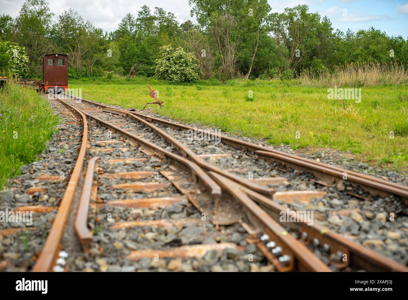 railway junction, and the back of a small locomotive Stock Photo - Alamy