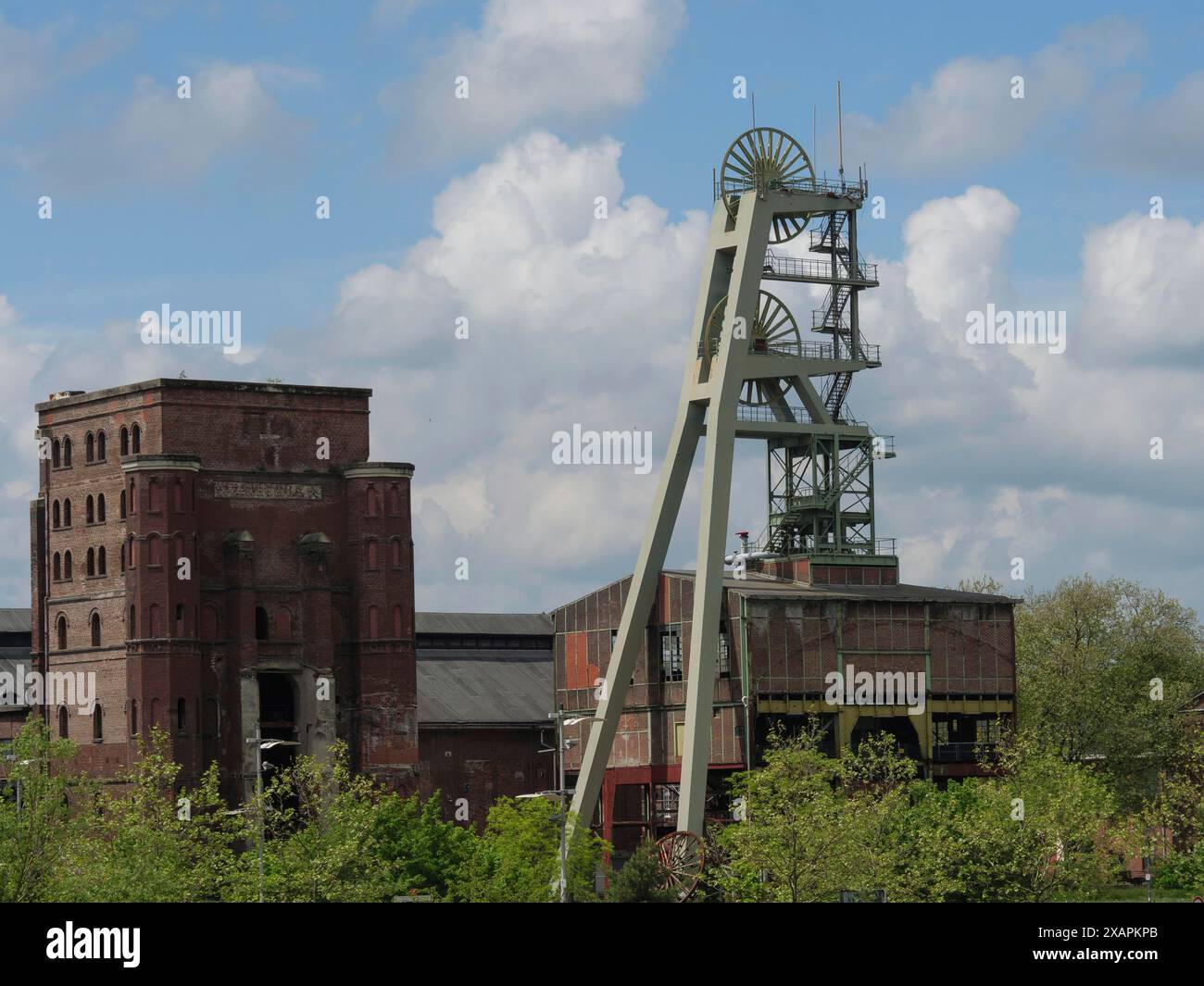 Industrial plant with striking shaft frame and old brick buildings ...