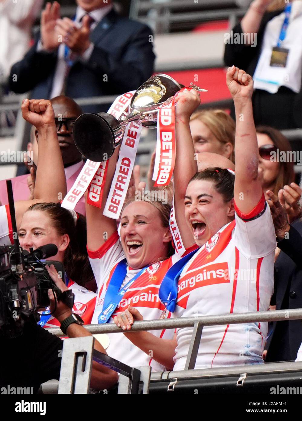 St Helens' Jodie Cunningham lifts the trophy after her side won the ...