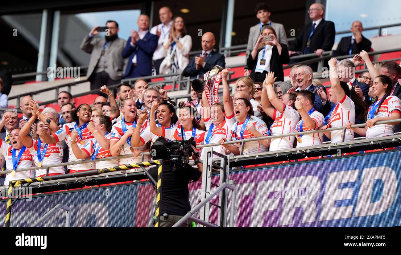 St Helens' Jodie Cunningham lifts the trophy after her side won the ...