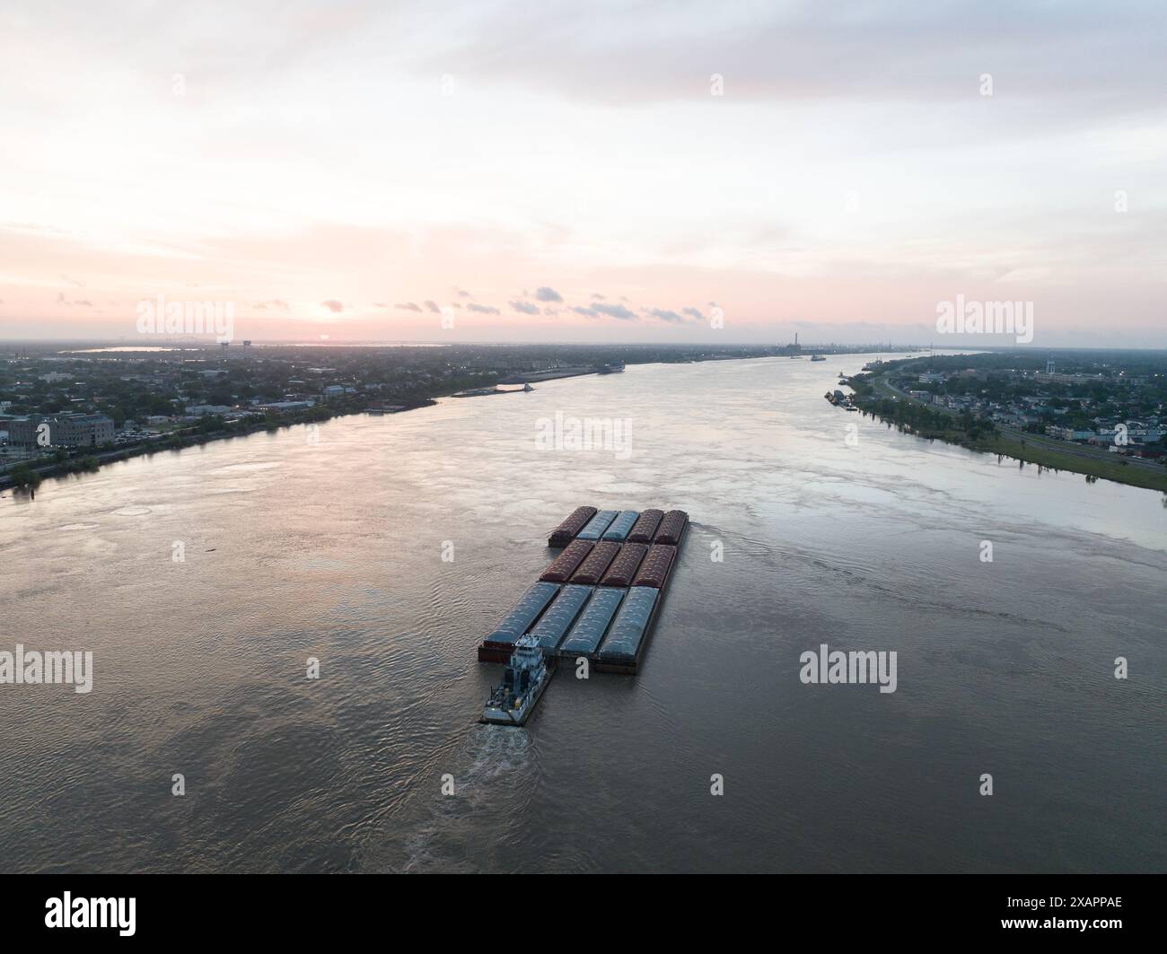 Aerial view of the Mississippi River at dawn near New Orleans, with a ...
