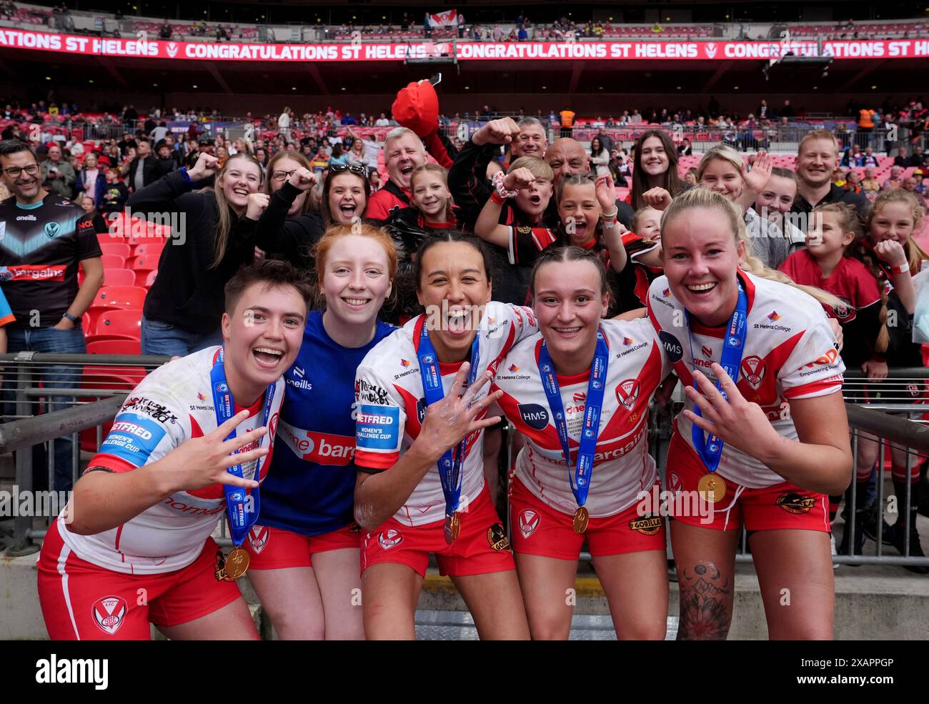 St Helens' players celebrate after winning the Betfred Women's ...