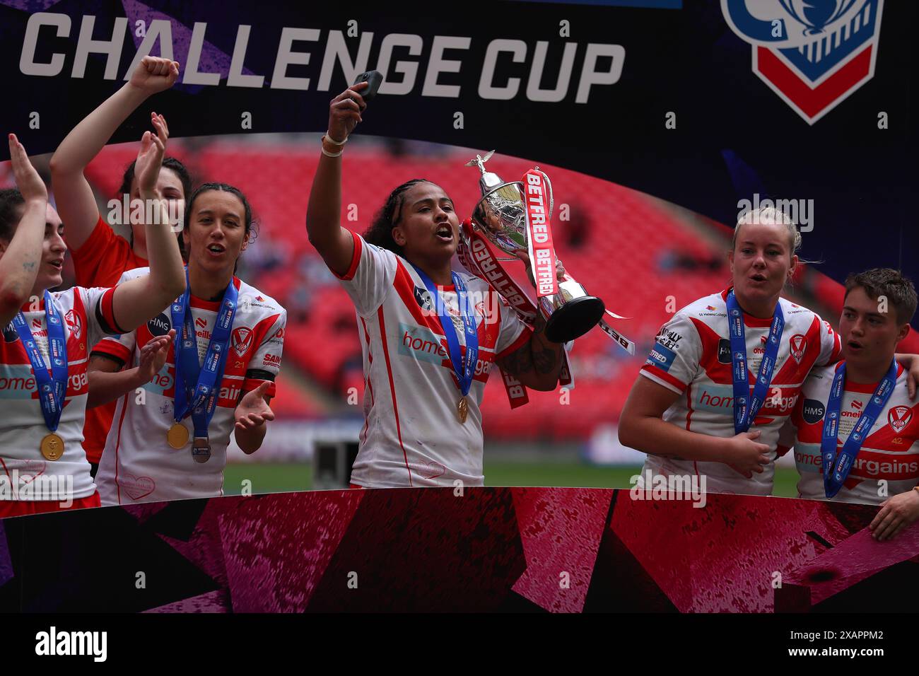 St Helens celebrate lifting the trophy following the Betfred Women's ...
