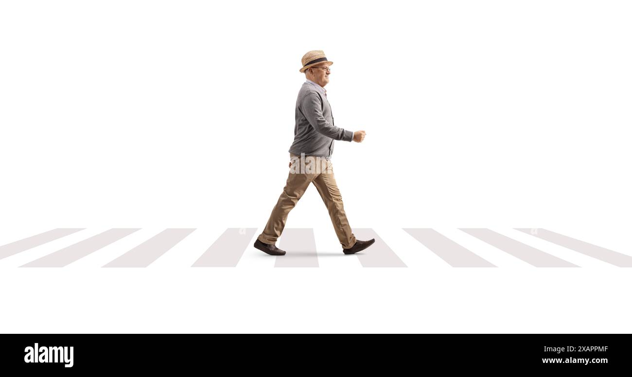 Full length profile shot of an elderly gentleman walking at a ...