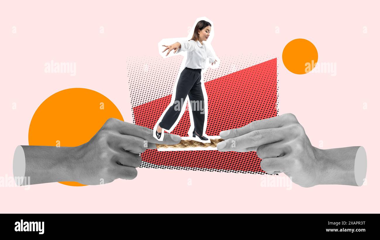 A woman is balancing on a bridge with her hands on a piece of paper ...