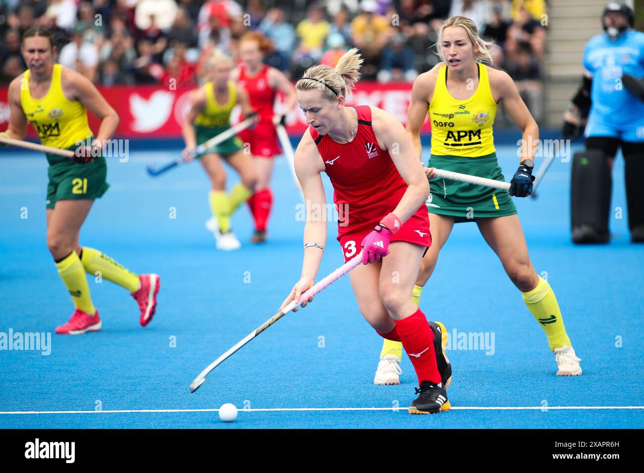 Great Britain's Elena Rayer battles for the ball against Australia's ...