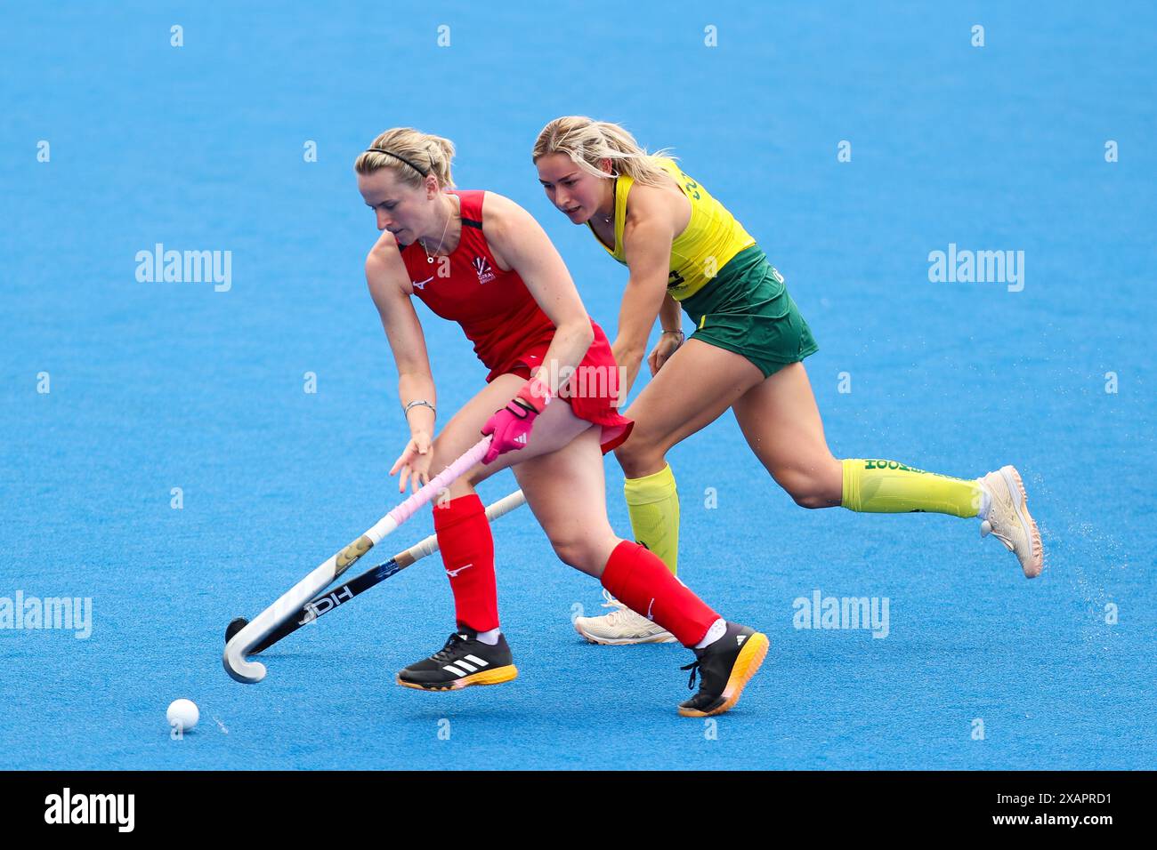 Australia's Claire Colwill battles for the ball against Great Britain's ...