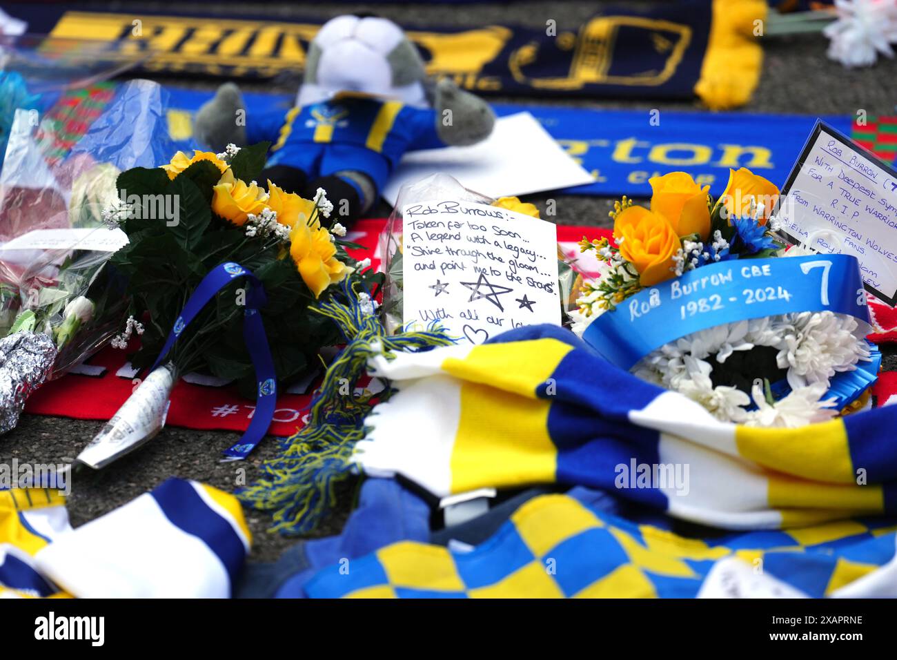 Tributes for former Leeds Rhinos player Rob Burrow outside the stadium ...