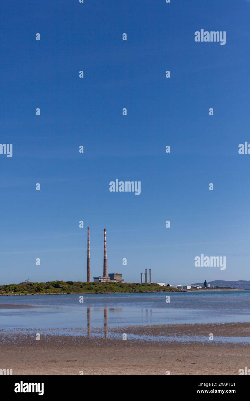 Sandymount beach during low tide with the iconic Poolbeg Chimneys in ...
