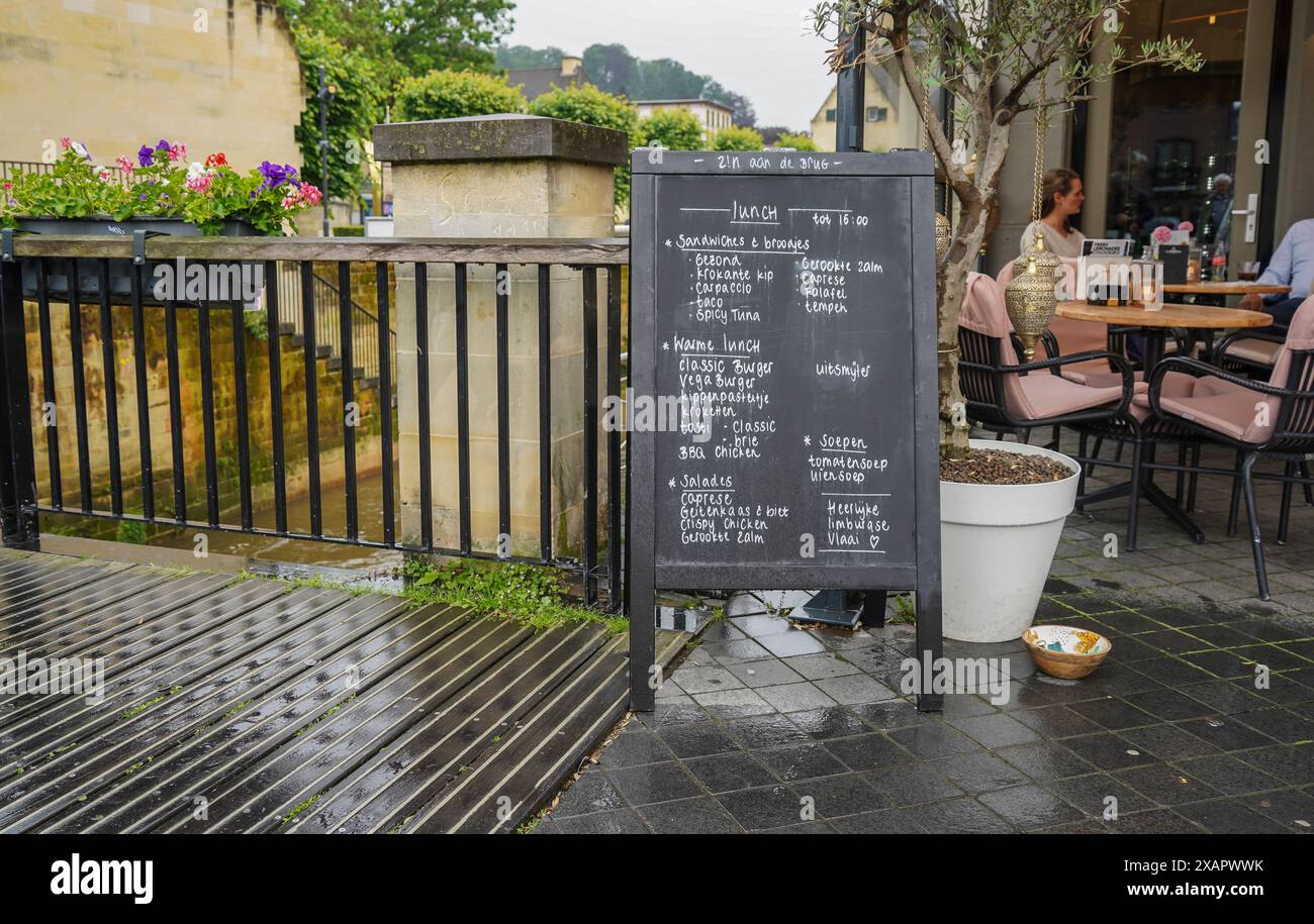 Chalk board with menu written in front of Restaurant In Valkenburg ...