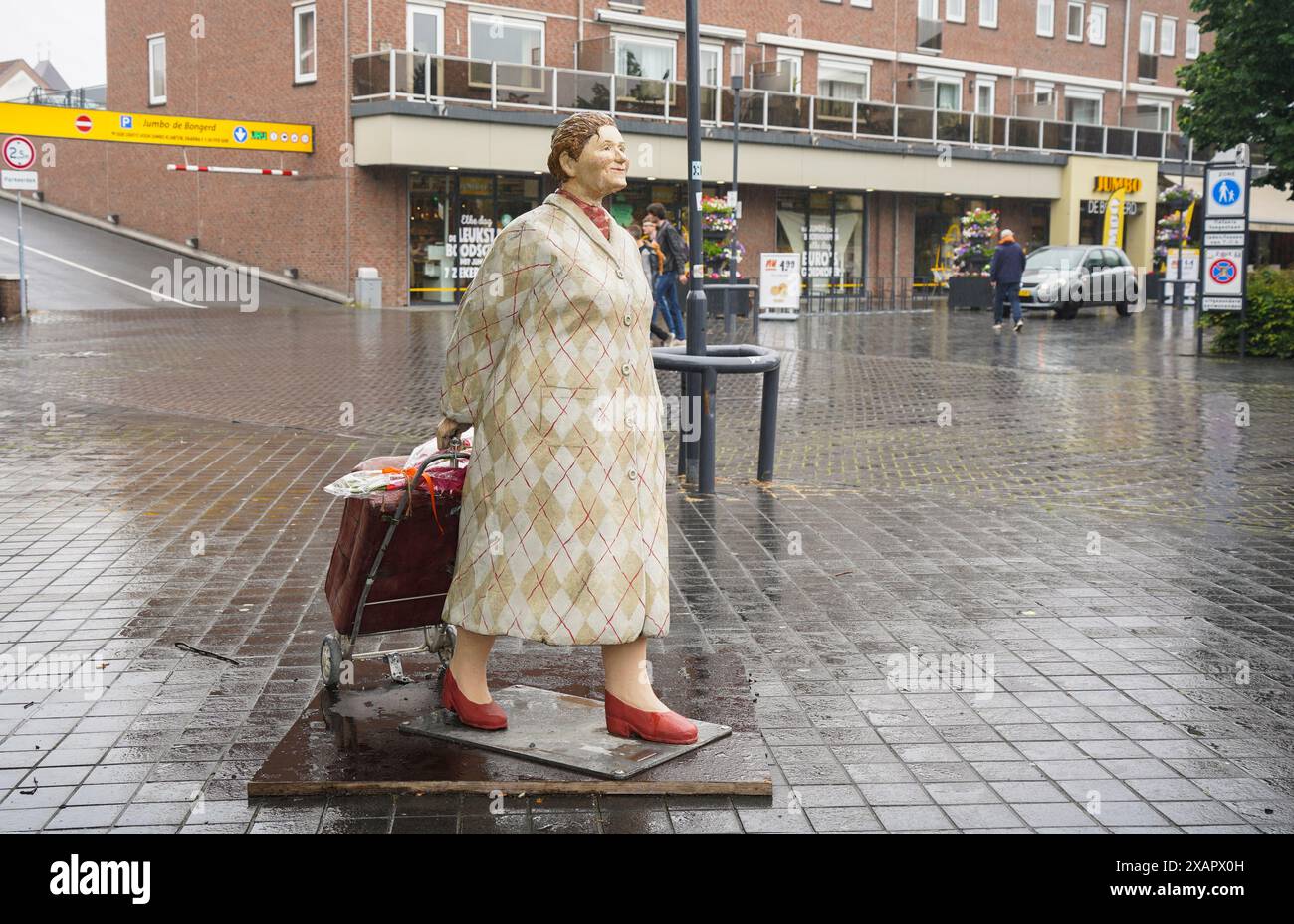 Statues, figures of everyday people in the city of Valkenburg ...