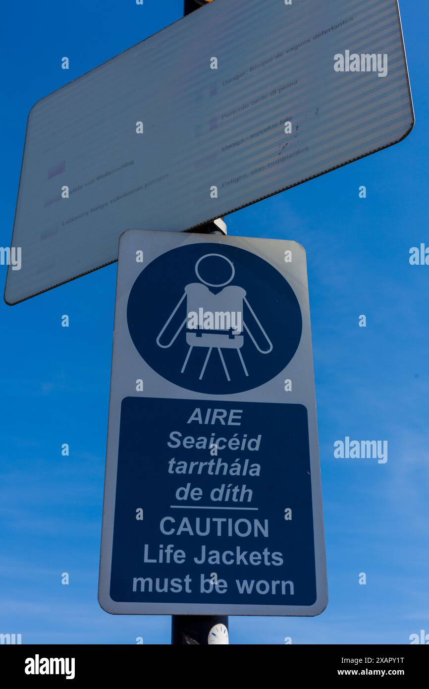 Caution sign displaying life jackets must be worn message. The sign is ...