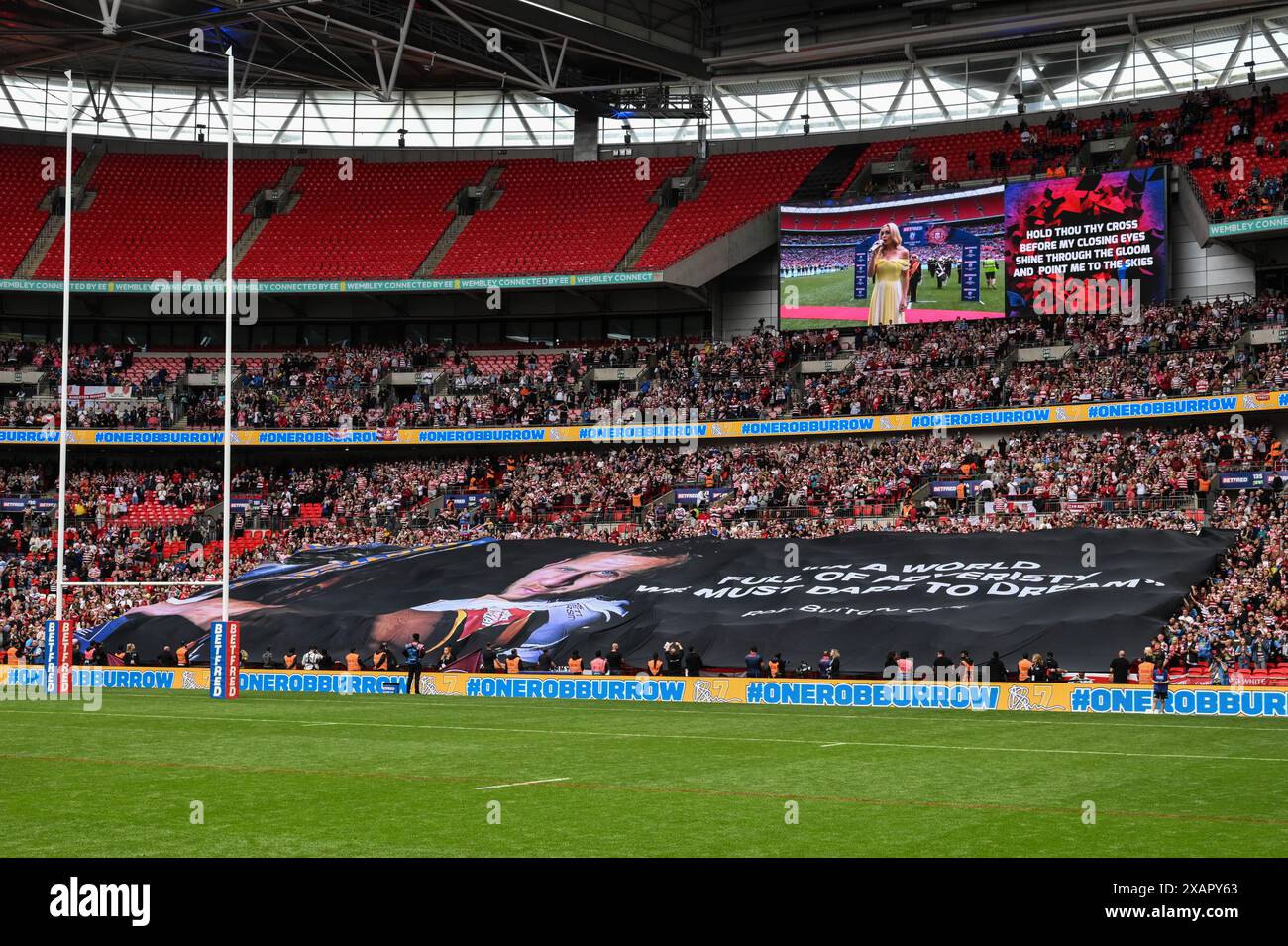 Fans with a tifo in memory of Rob Burrow CBE ahead of the Betfred ...