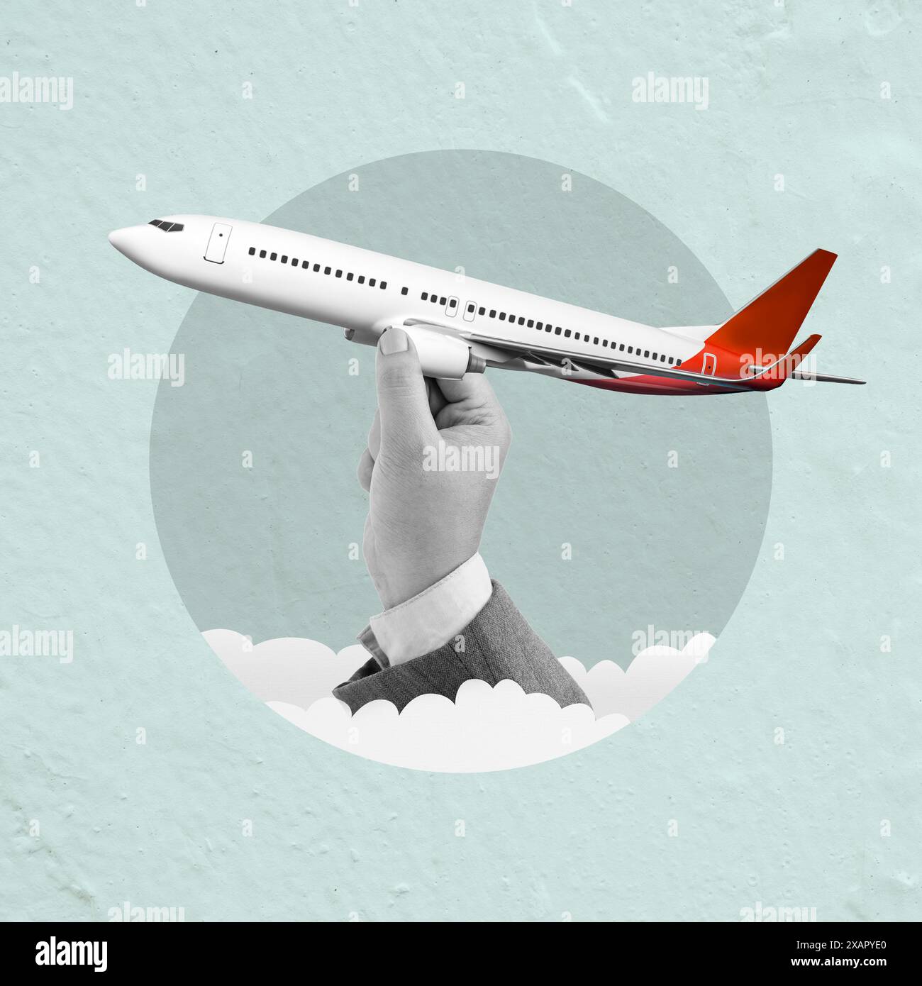 Business hand holding a passenger airplane with a colored background ...