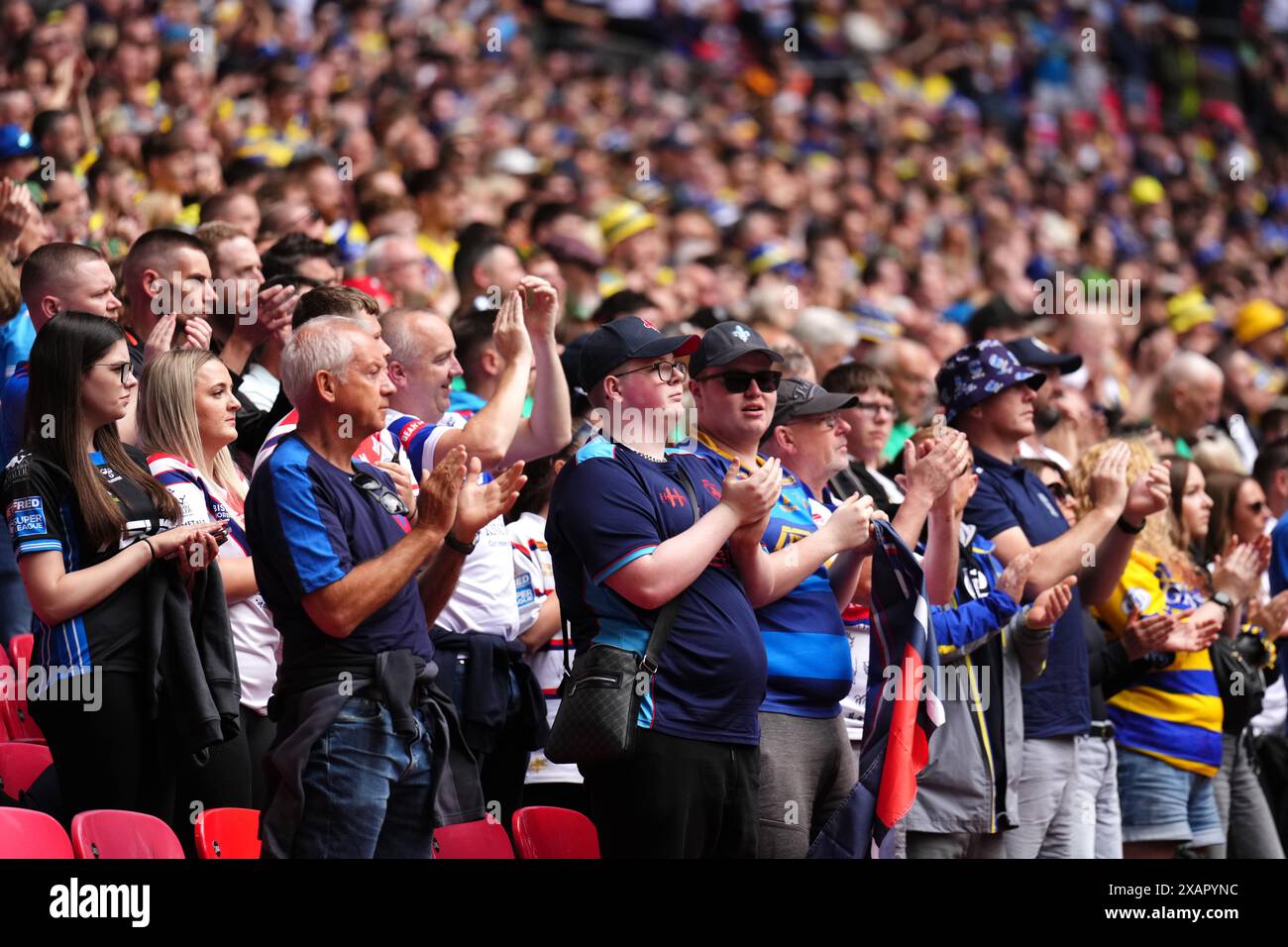 Fans during a minute applause on the 7th minute in tribute to Rob ...
