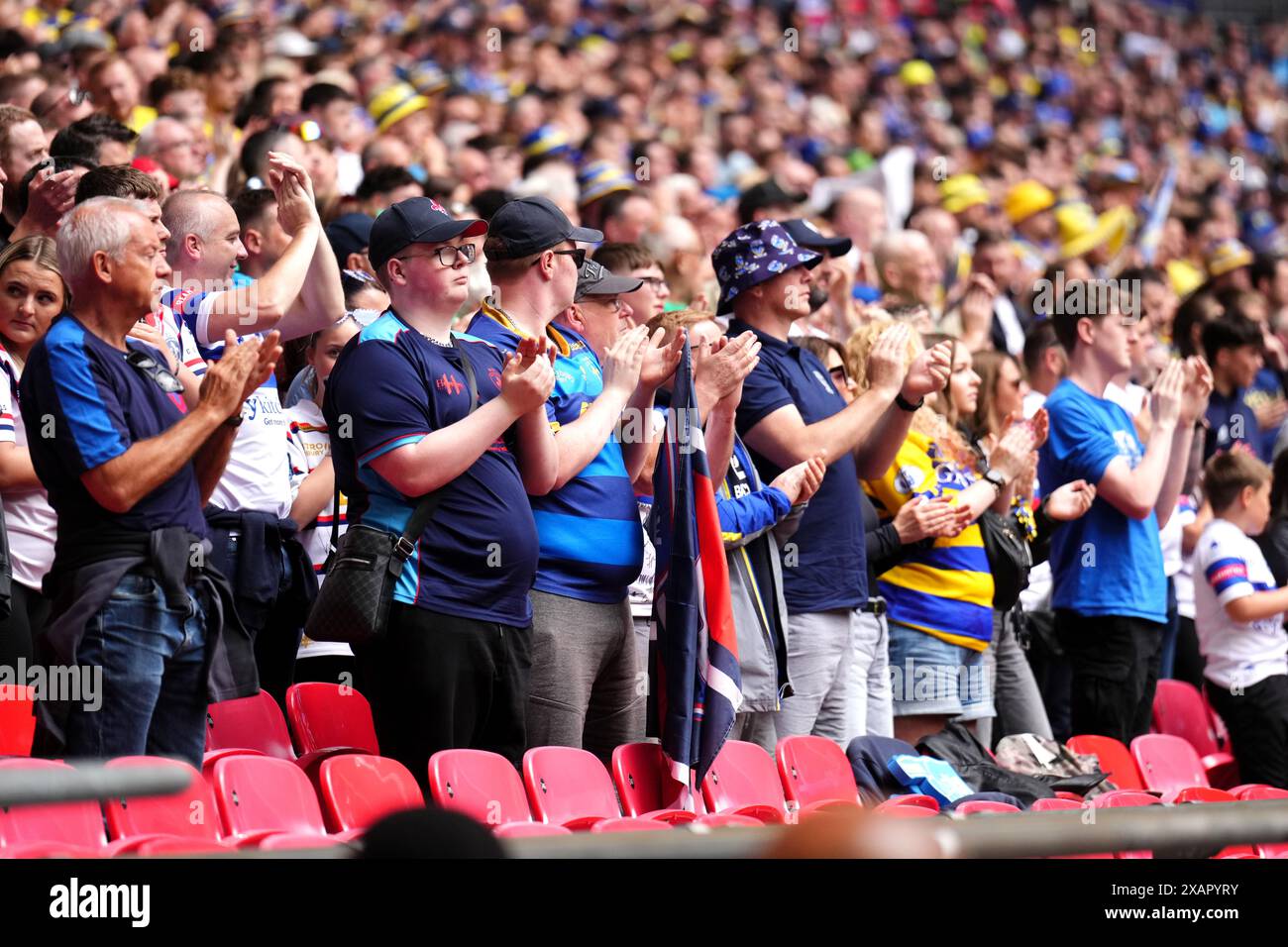 Fans during a minute applause on the 7th minute in tribute to Rob ...