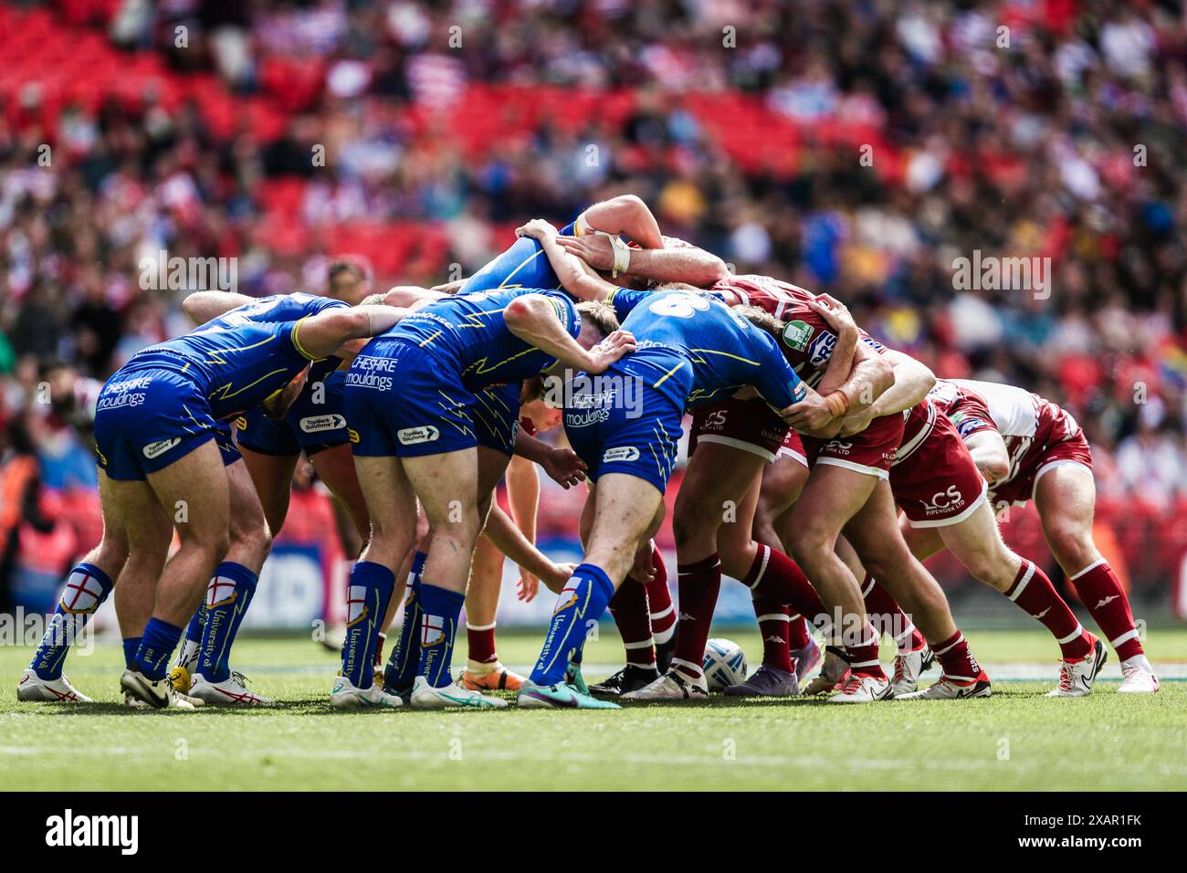 Players form a scrum during the Betfred Challenge Cup Final match ...