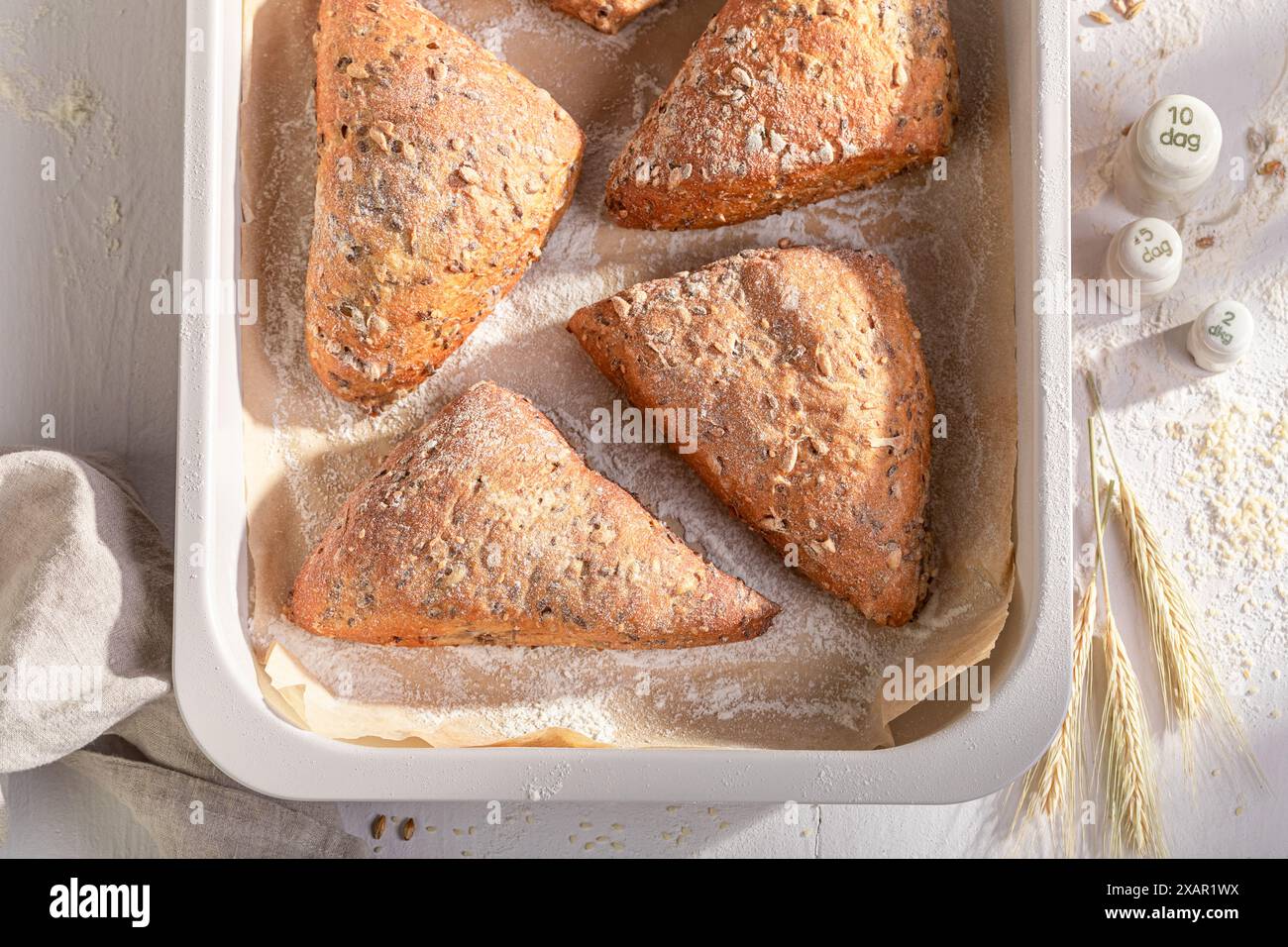 Healthy and fresh triangular buns baked in a bakehouse. Triangular buns ...