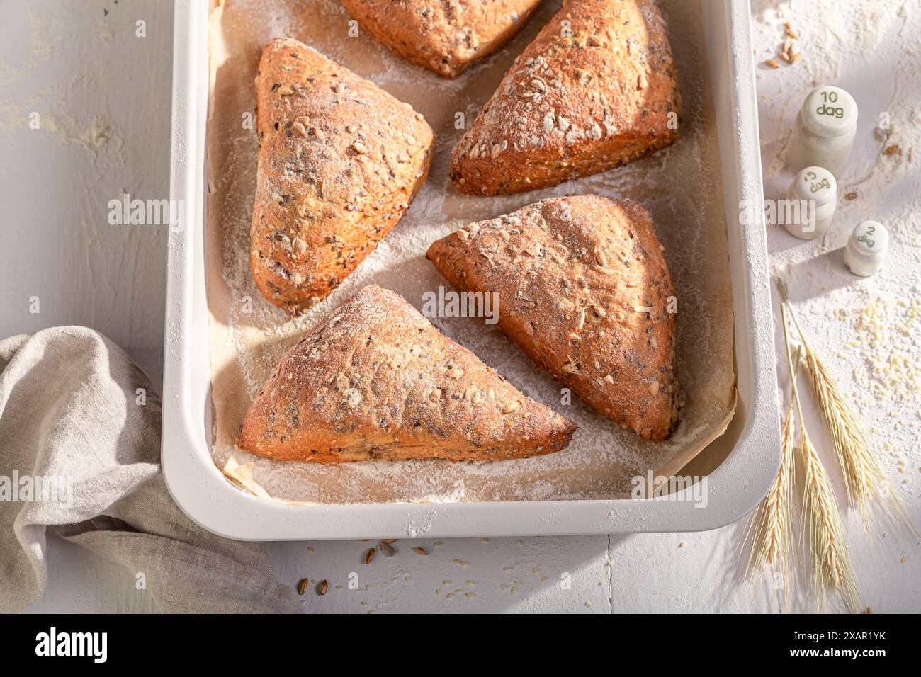 Brown and tasty triangular rolls made of sourdough and flour ...