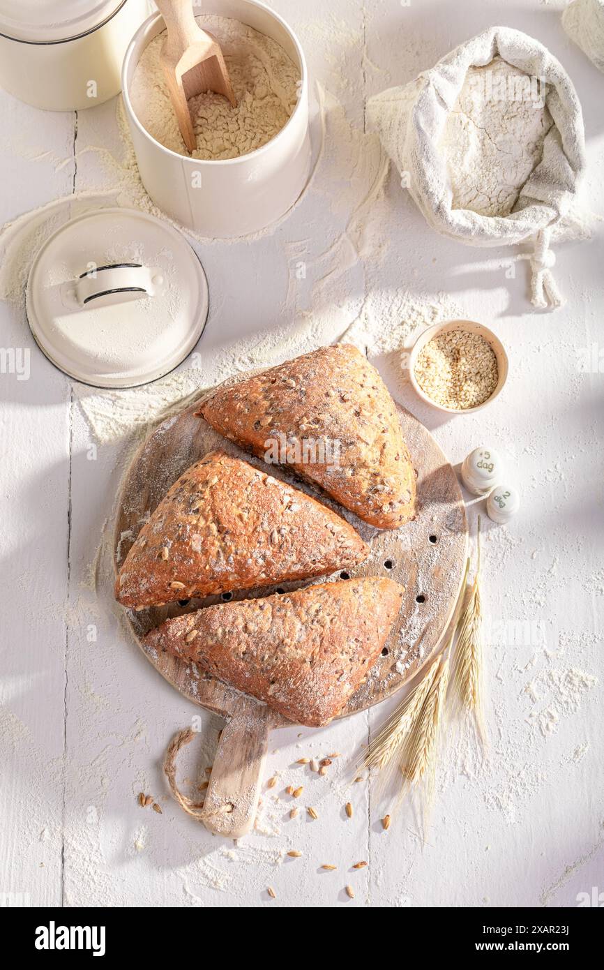 Hot and healthy triangular buns baked in a bakehouse. Triangular rolls ...