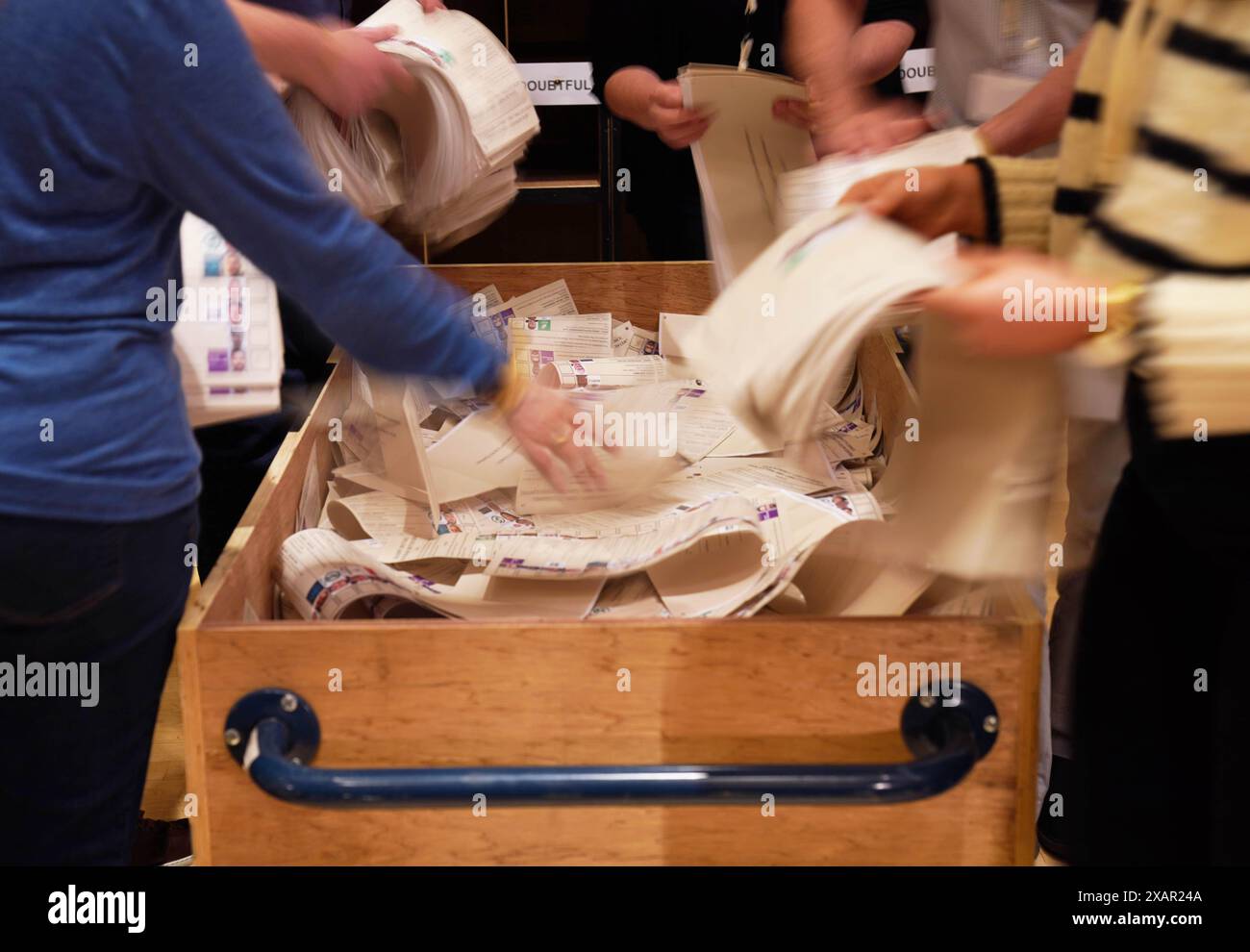 Counting staff at Cork City Hall sort ballots during local elections in ...