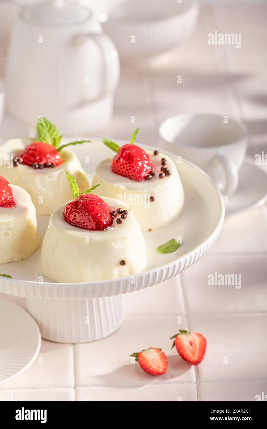 Delicious cheesecake monoportion decorated with strawberries and ...