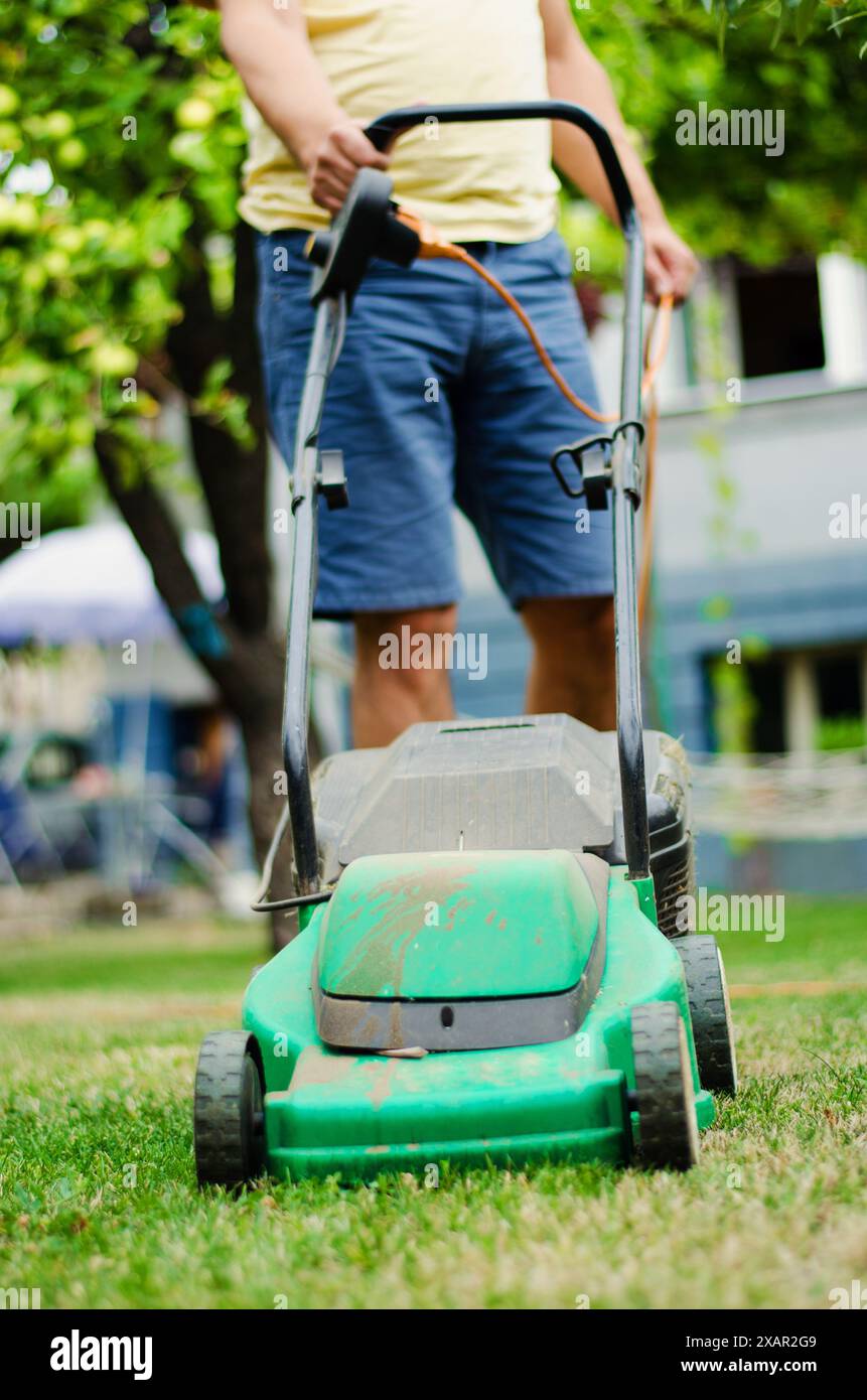 Lawnmower mows hi-res stock photography and images - Alamy