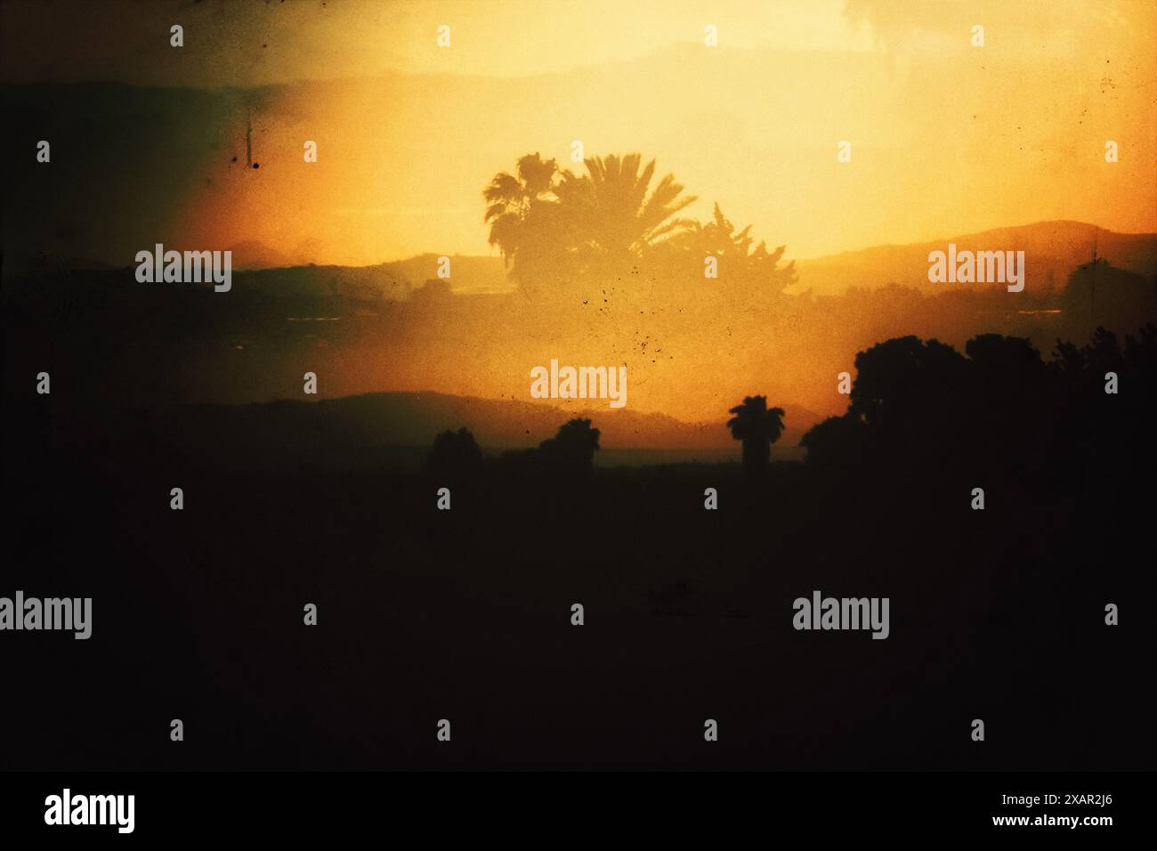 Tropical landscape Mountains, hills on horizon in sunset. Double ...
