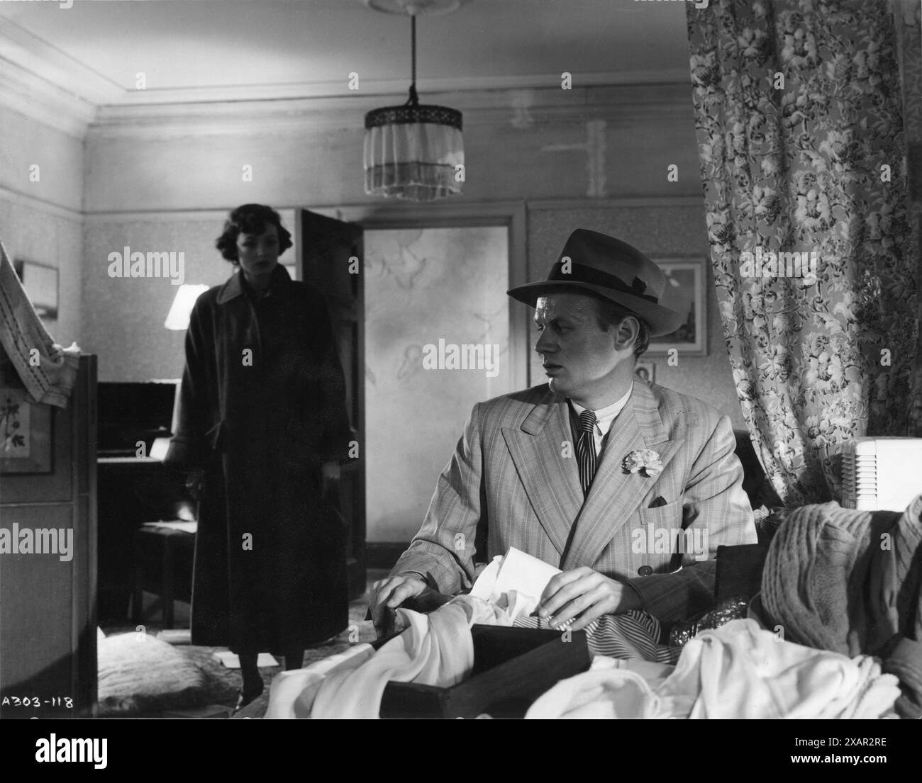 GENE TIERNEY and RICHARD WIDMARK in a scene from NIGHT AND THE CITY ...