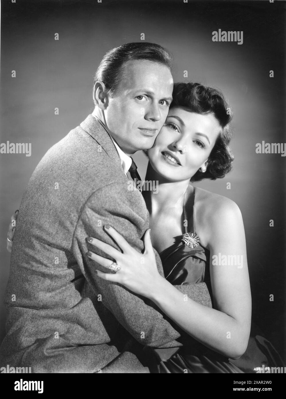 A publicity portrait of RICHARD WIDMARK and GENE TIERNEY for NIGHT AND ...