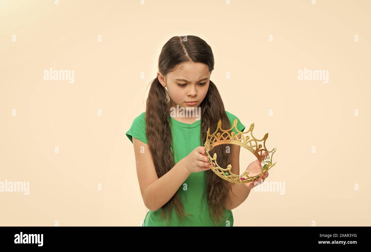 Price of the throne. Kid wear golden crown symbol of princess. Girl ...